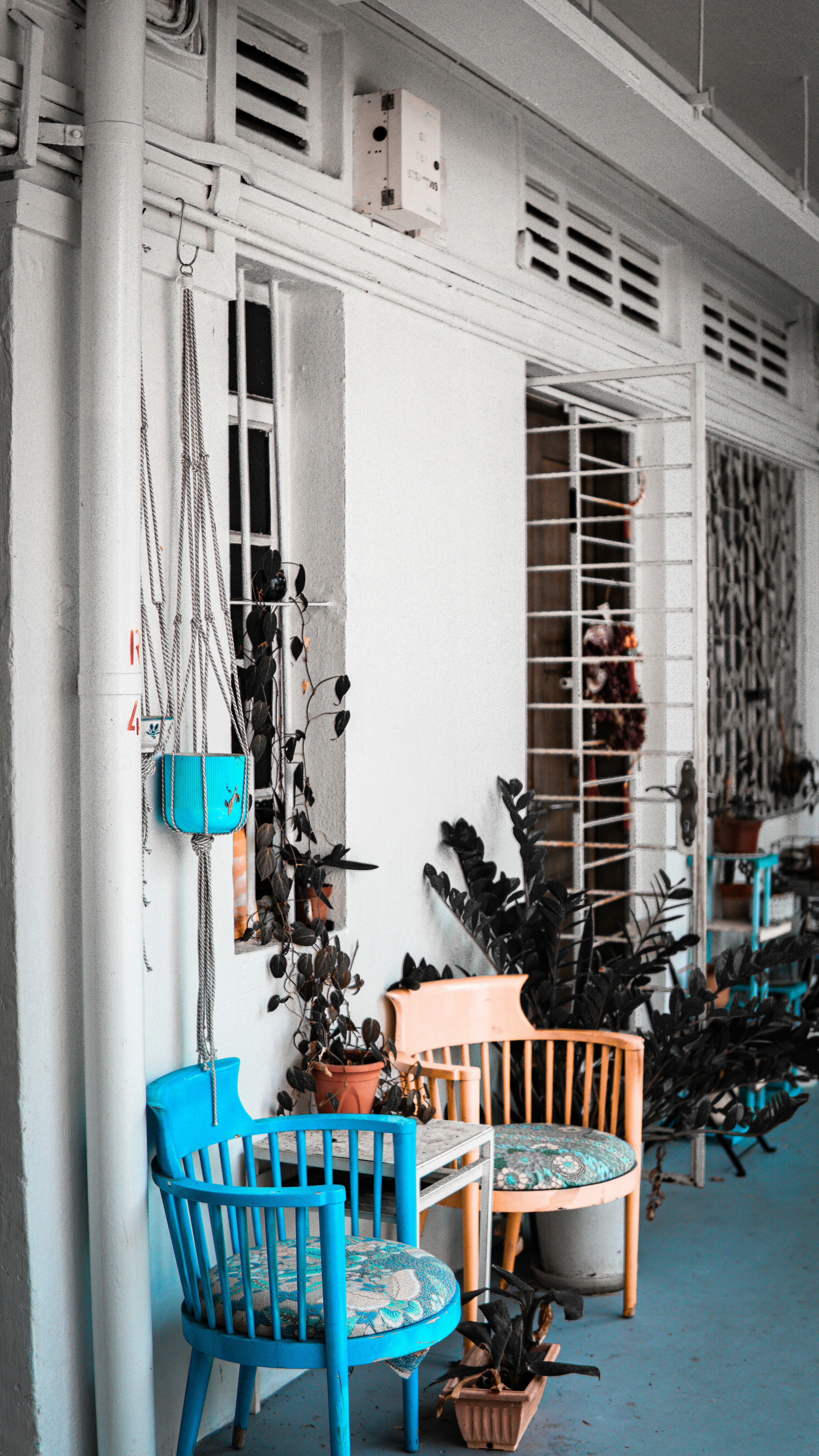 Terracotta and Teal Corner Café: A Quiet Porch Portrait