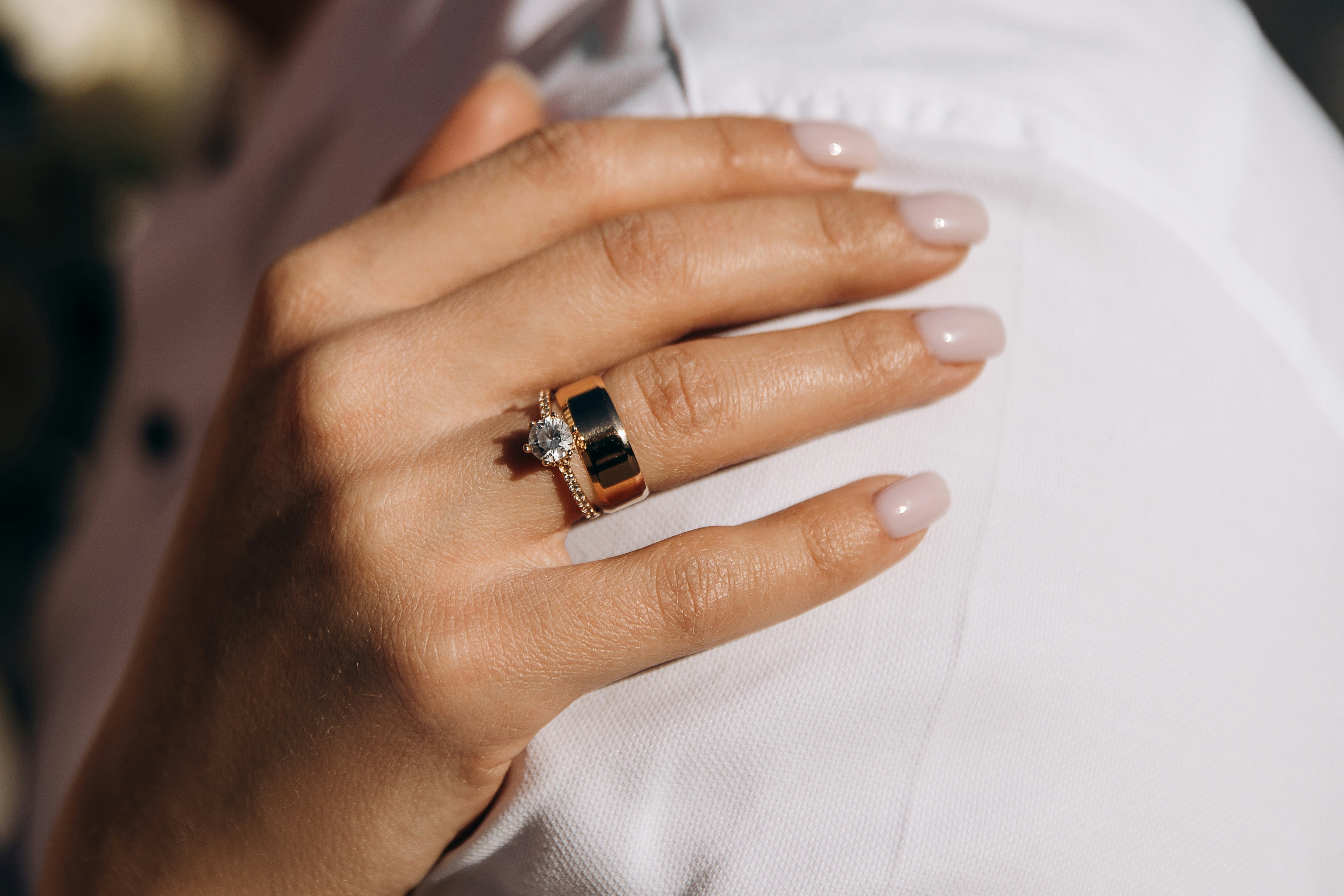 A woman wearing a ring with a cross on it photo – Free Jewelry Image on ...