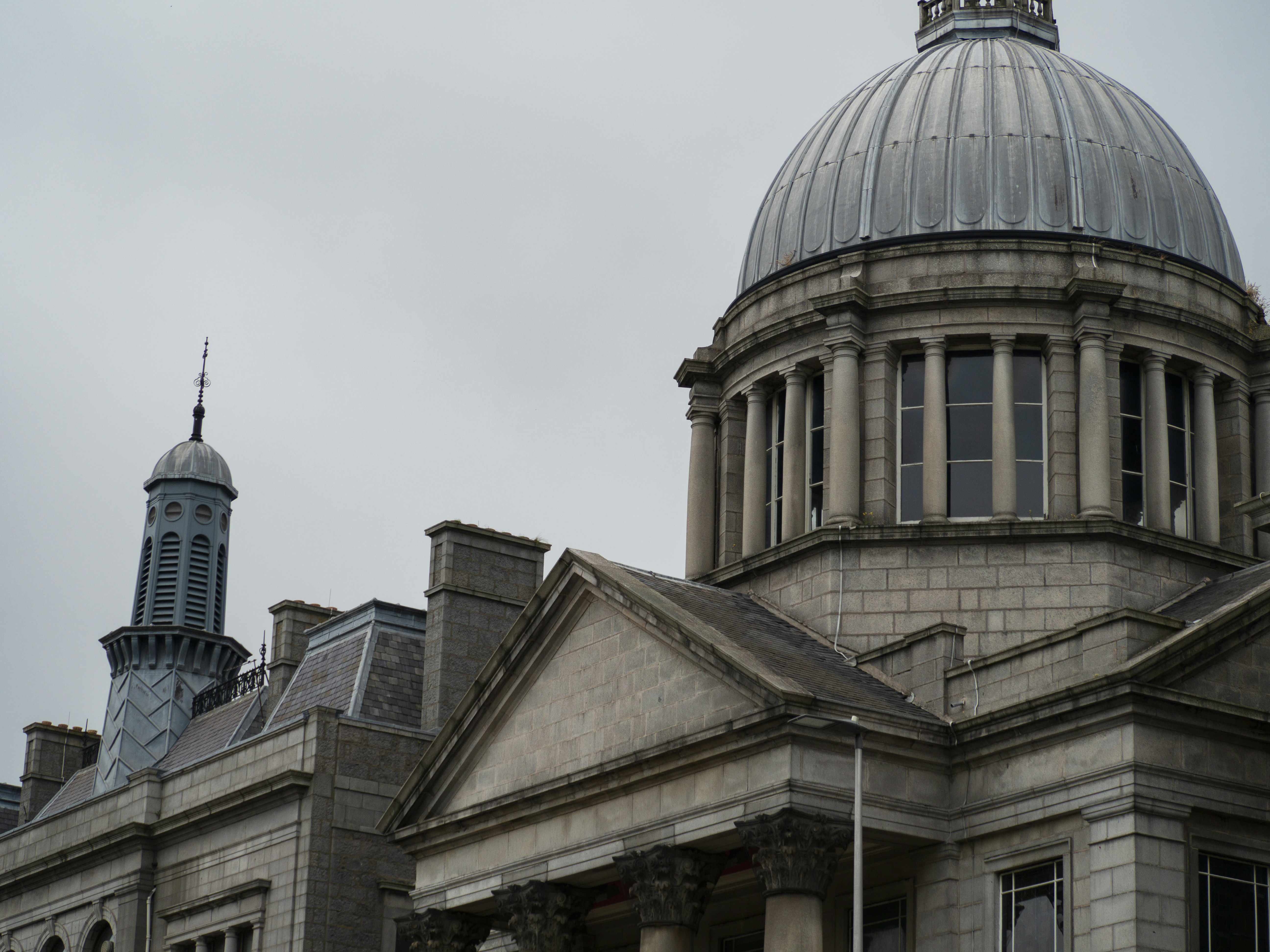 Crowned by Stone: Dome and Facade under a Leaden Sky
