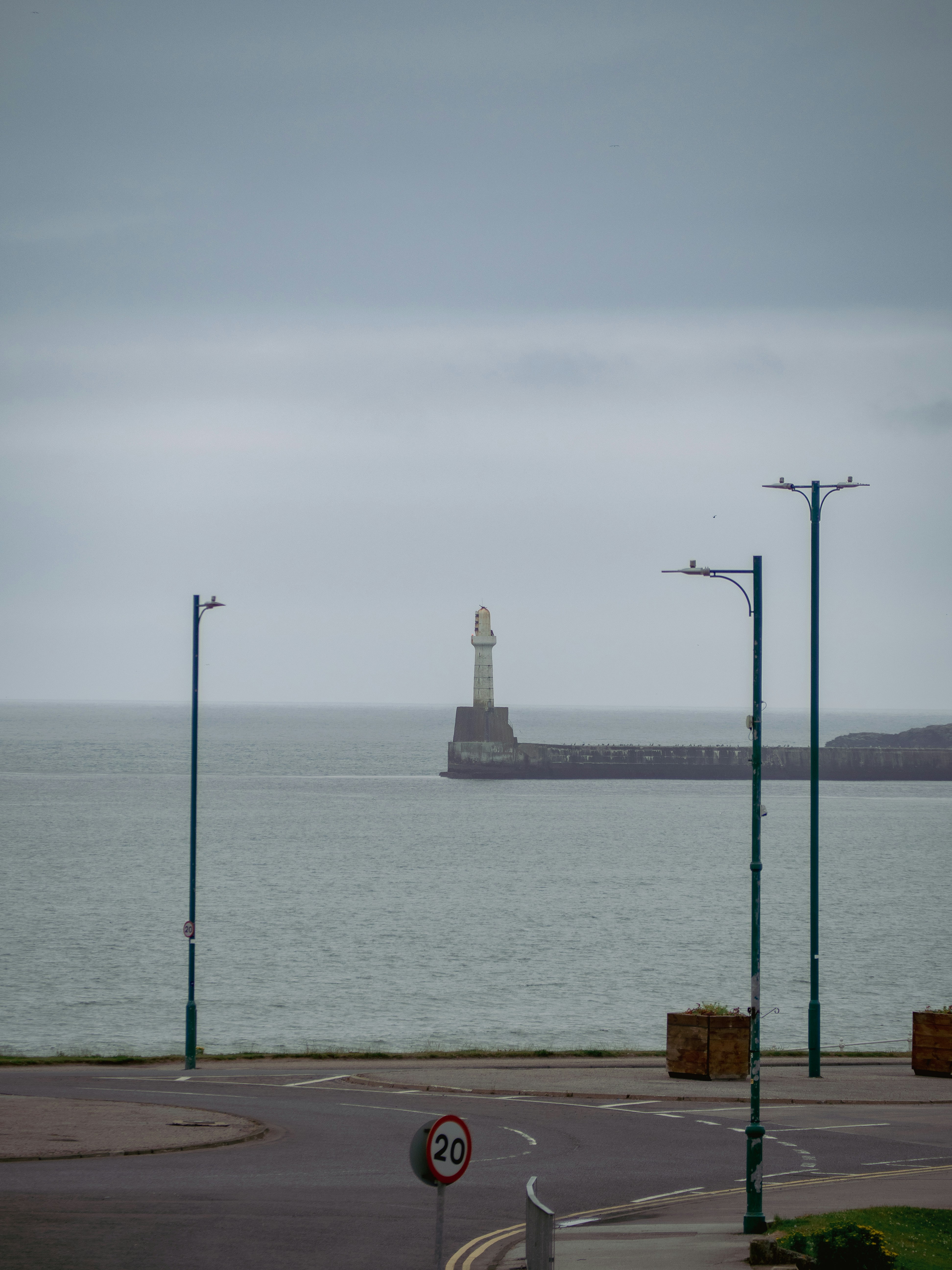 Beacon on the Breakwater: A Sea-Gray Moment