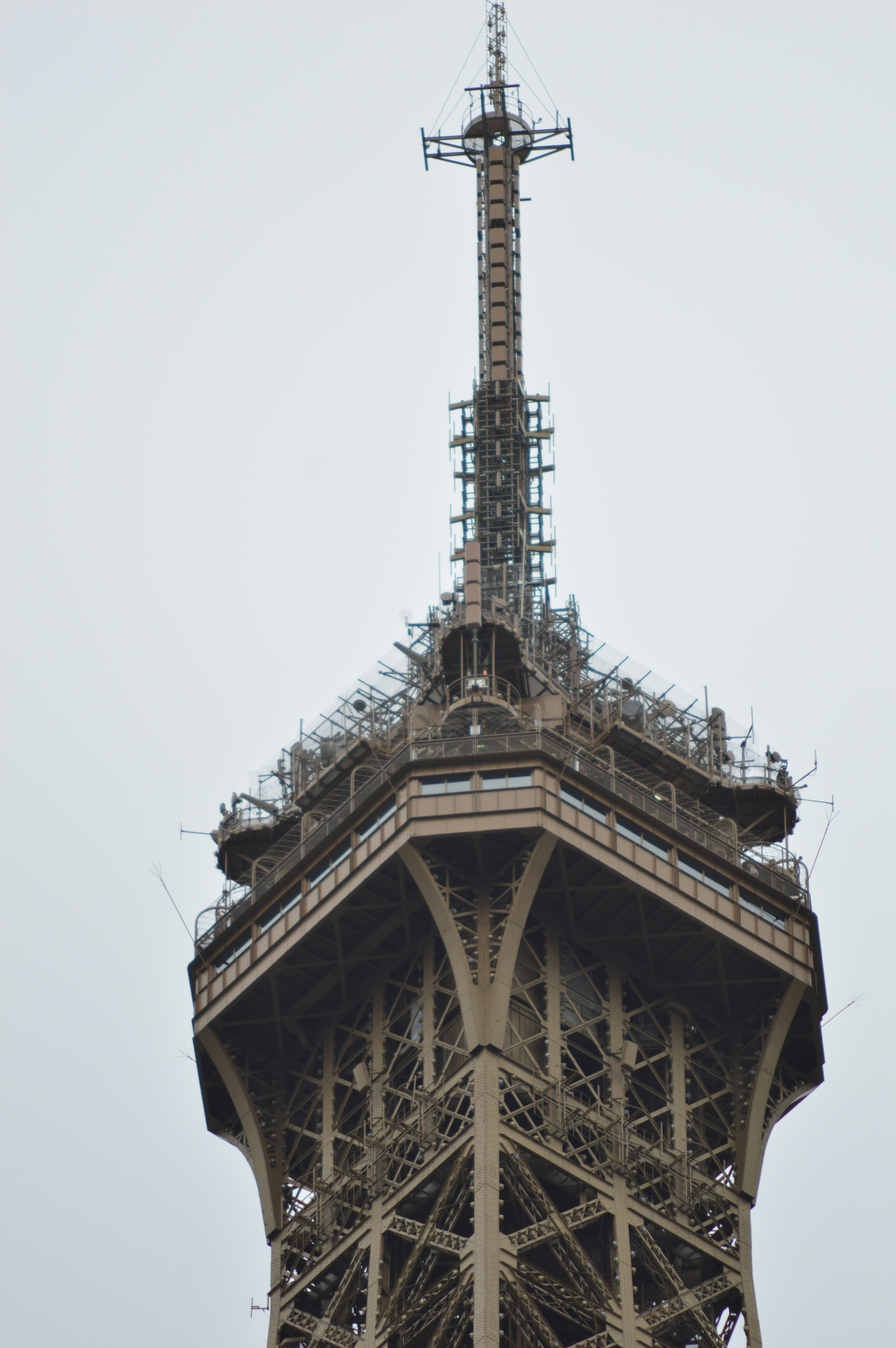 Apex in Steel: The Eiffel Tower's Crown Reaching Skyward