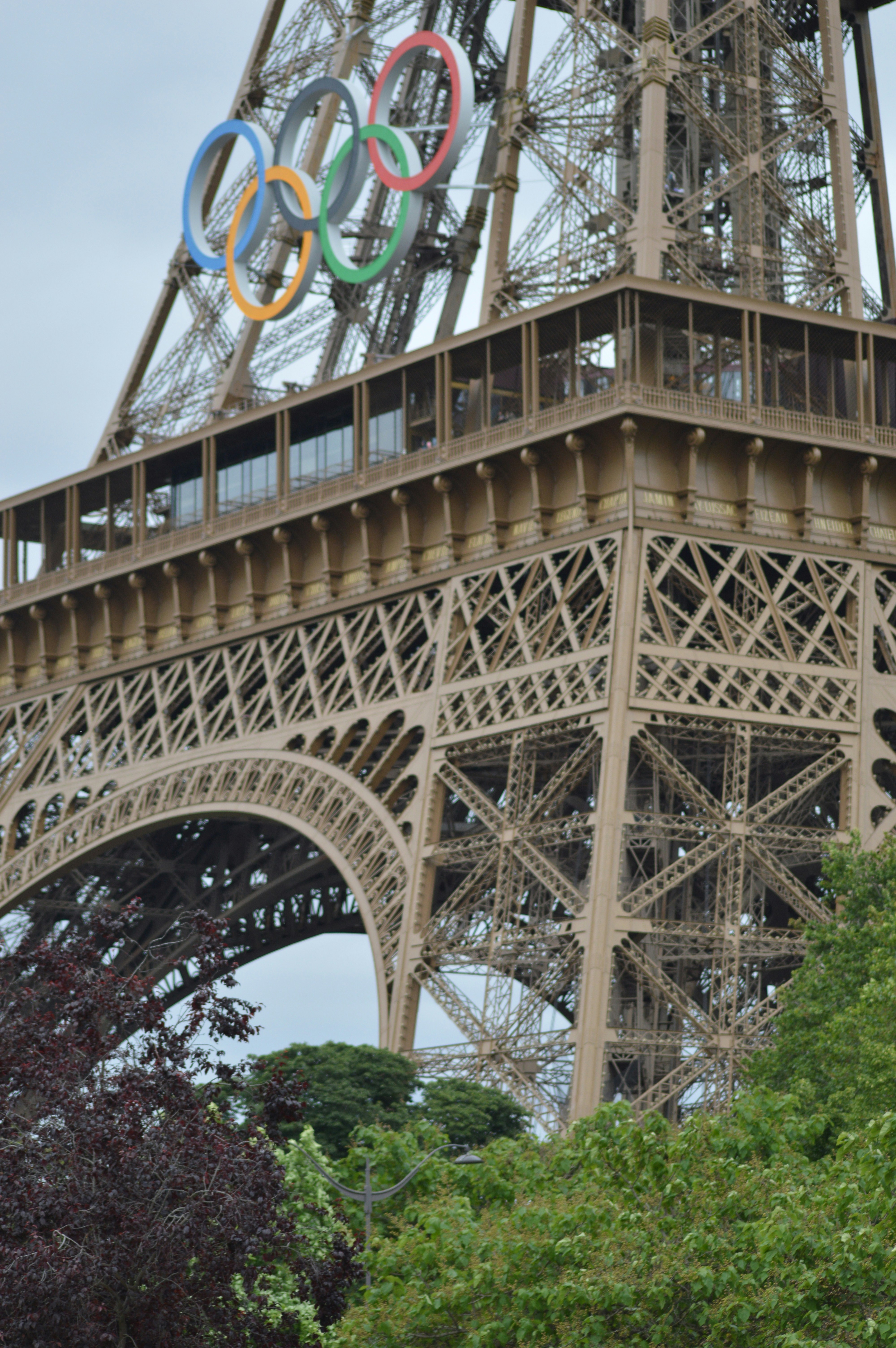 Olympic Rings Gracing the Iron Lace of the Eiffel Tower