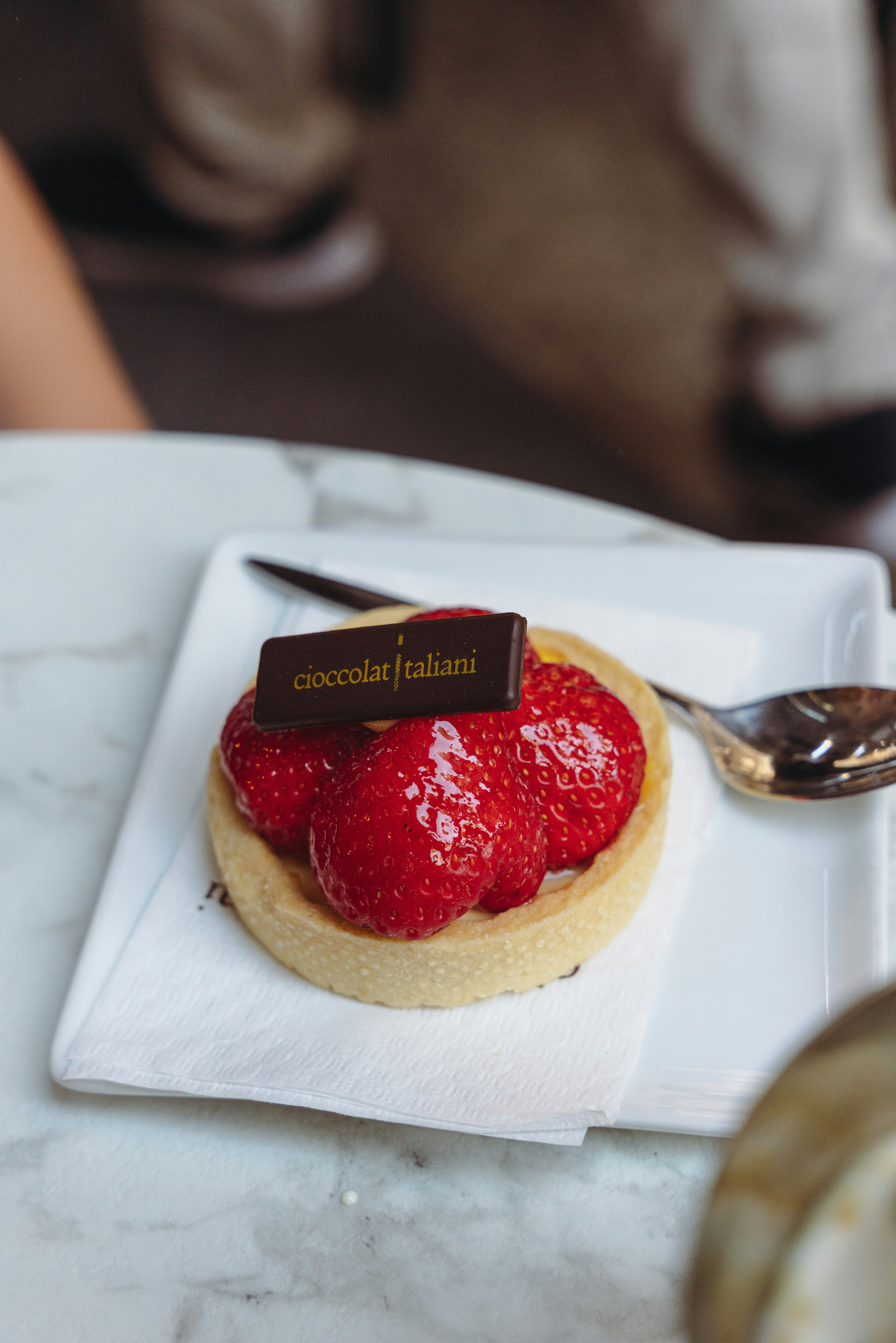 Scarlet Berries on a Crisp Tart: A Minimalist Dessert Portrait