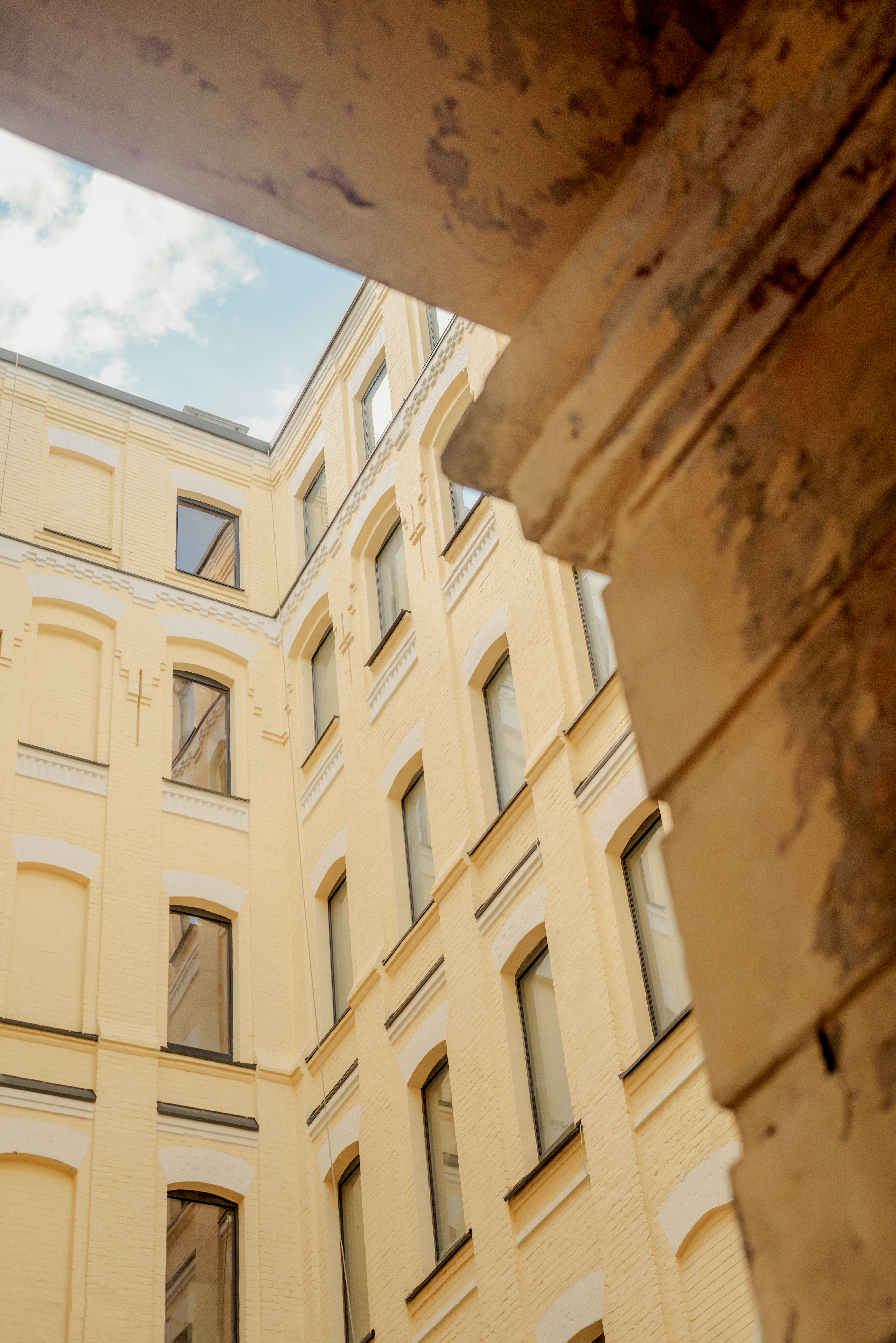 A view of a building through a window photo – Free Київ Image on Unsplash