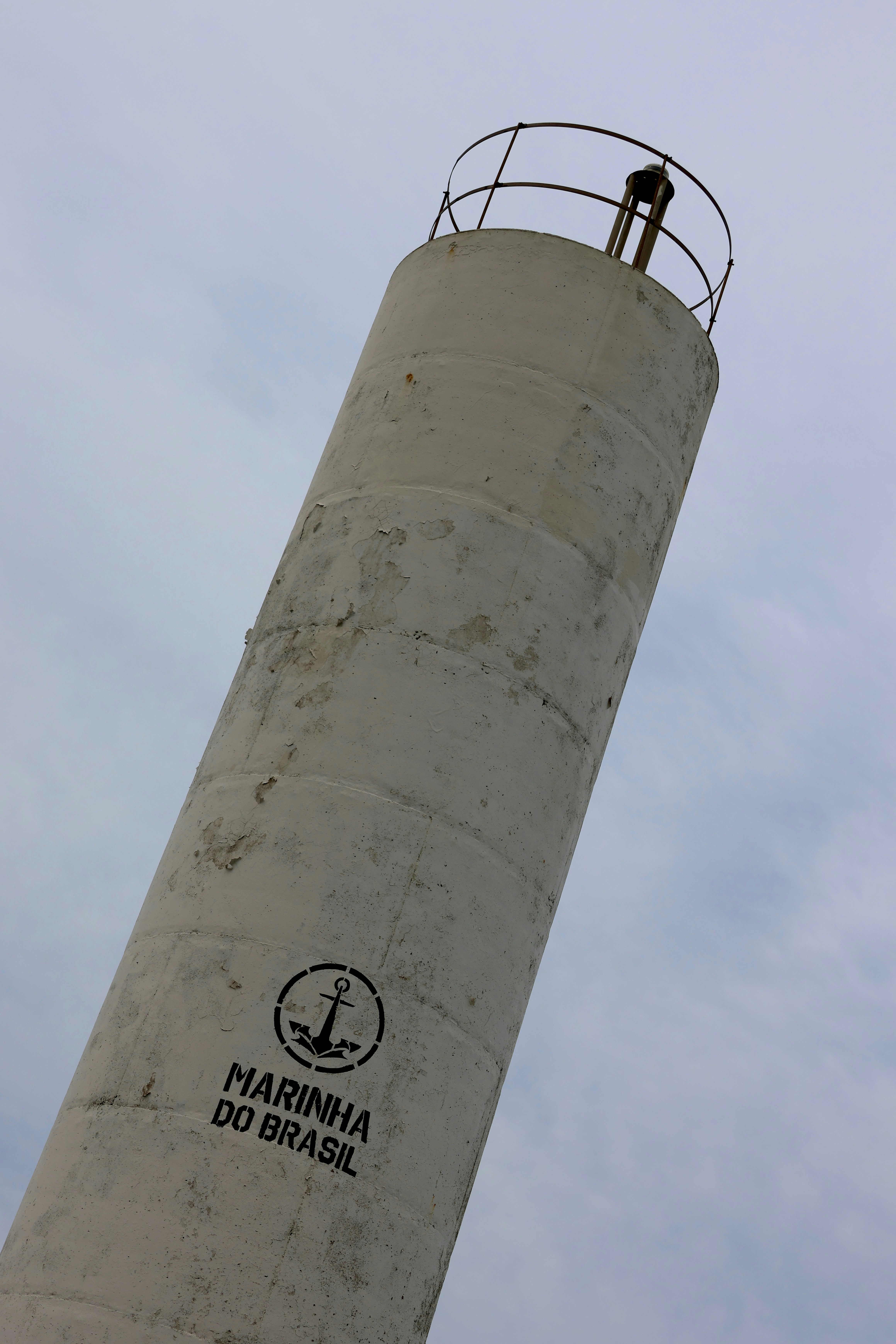Leaned Beacon: Brazilian Navy lighthouse against a pale sky
