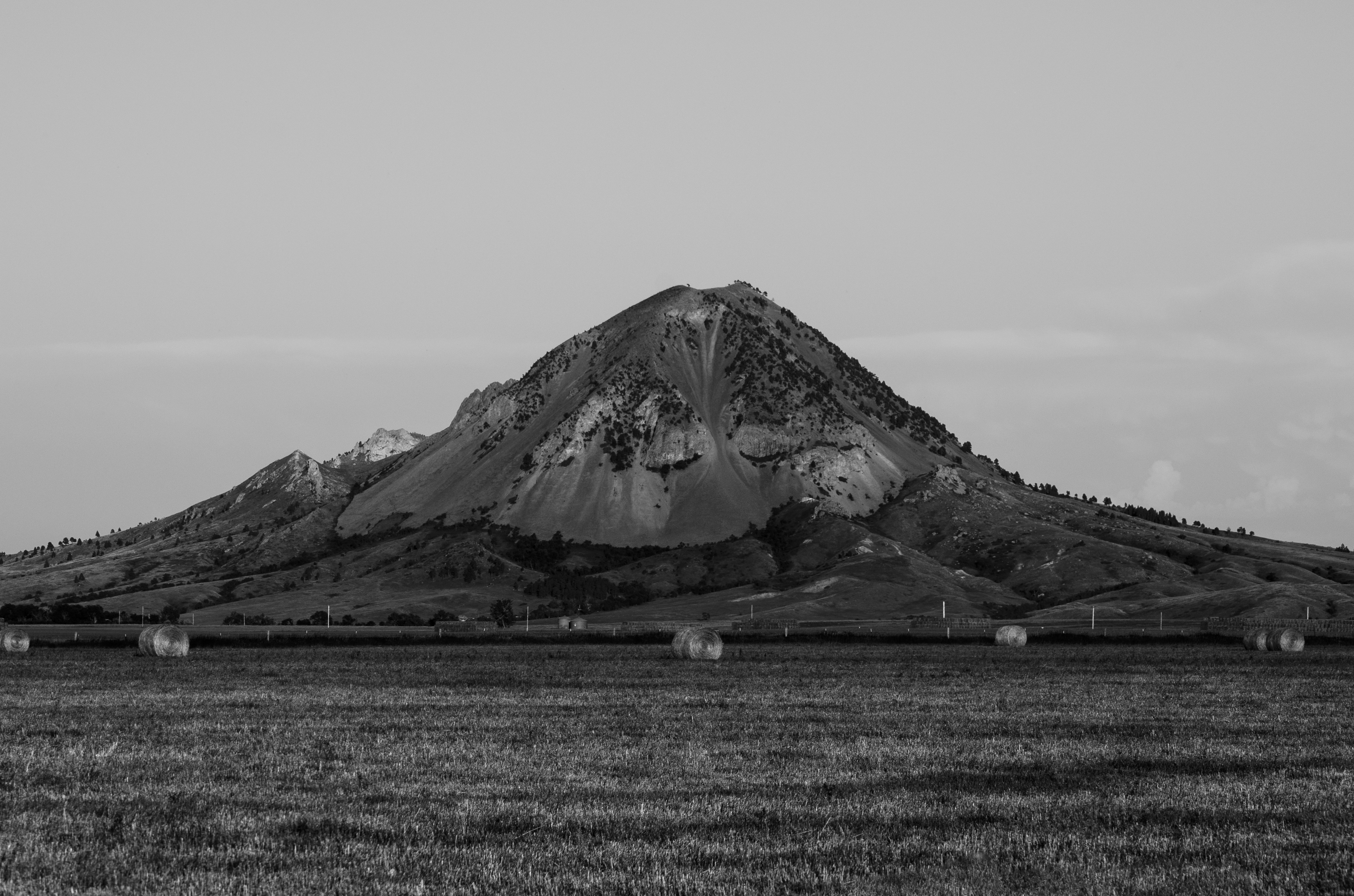 Prairie Sentinel: A Snow-Dusted Peak