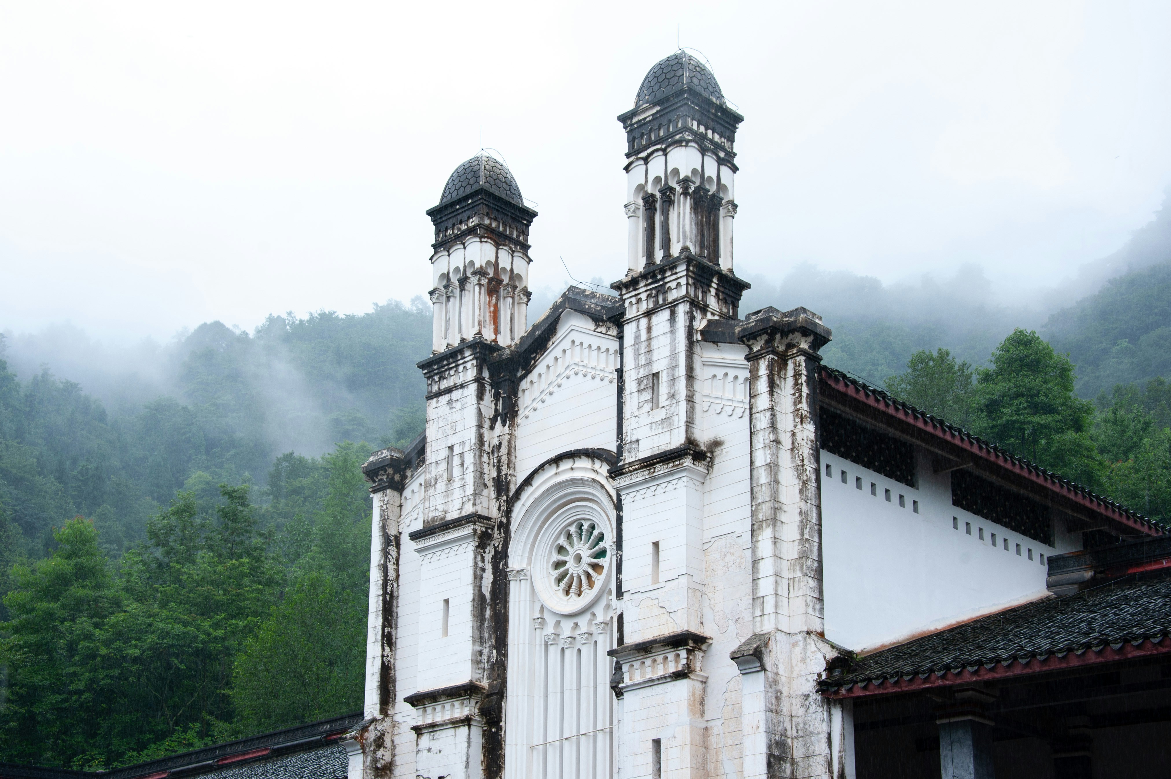 Rose Window in the Mist: A Gothic Church Reaches Through Fog