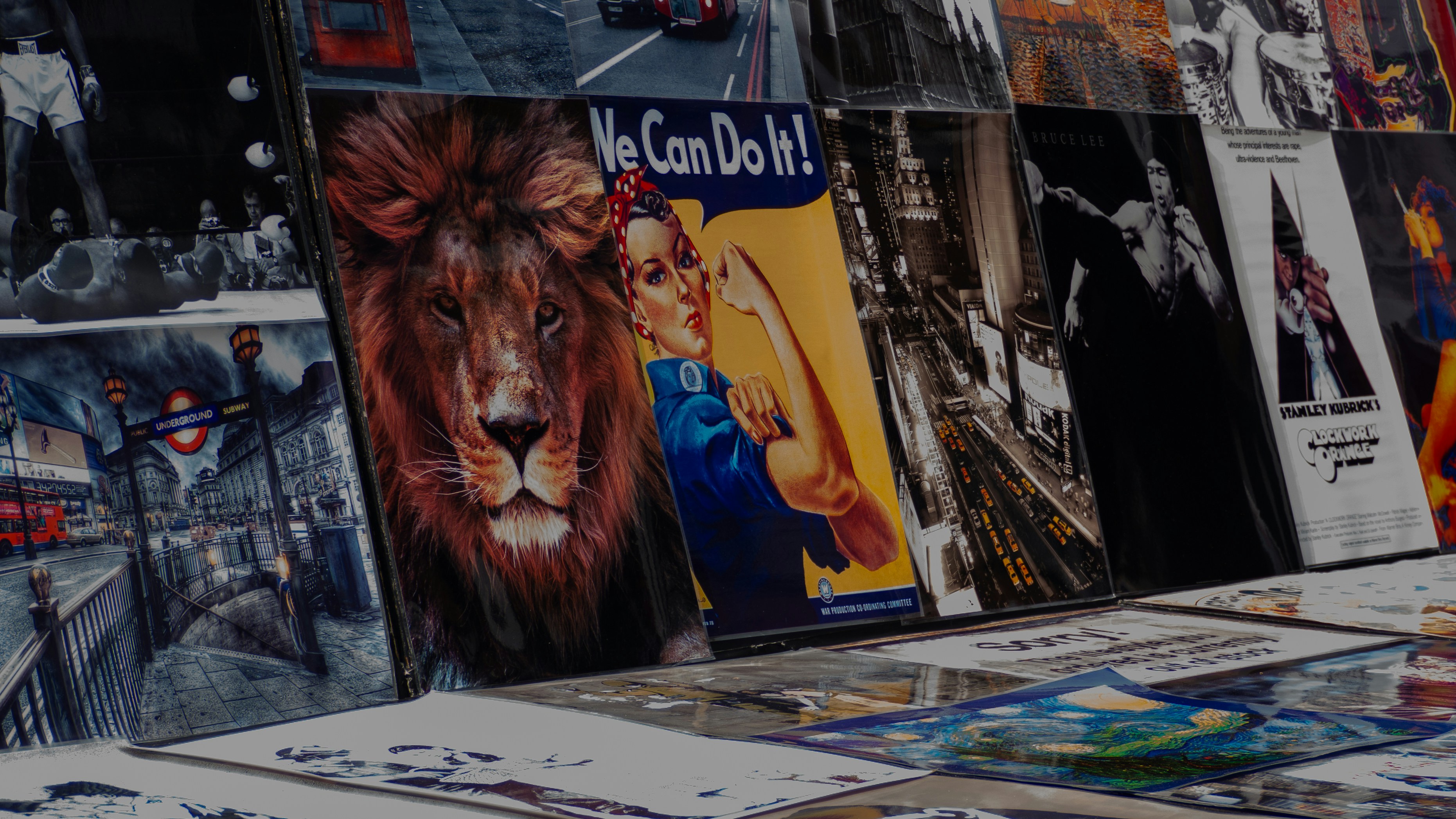 A bunch of posters that are on a wall photo – Free Car Image on Unsplash