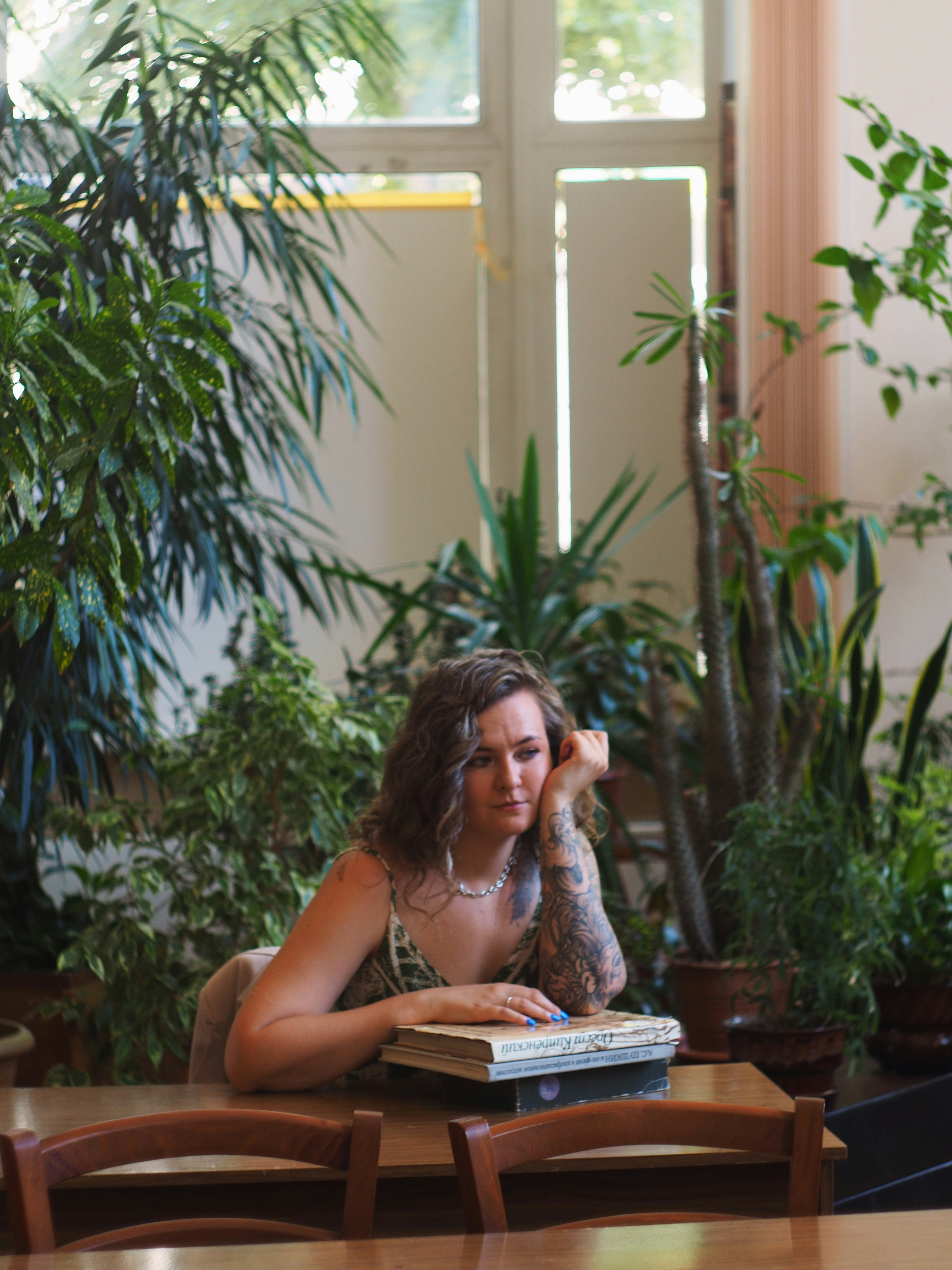 Ink and Leaves: A Quiet Portrait at the Reading Table