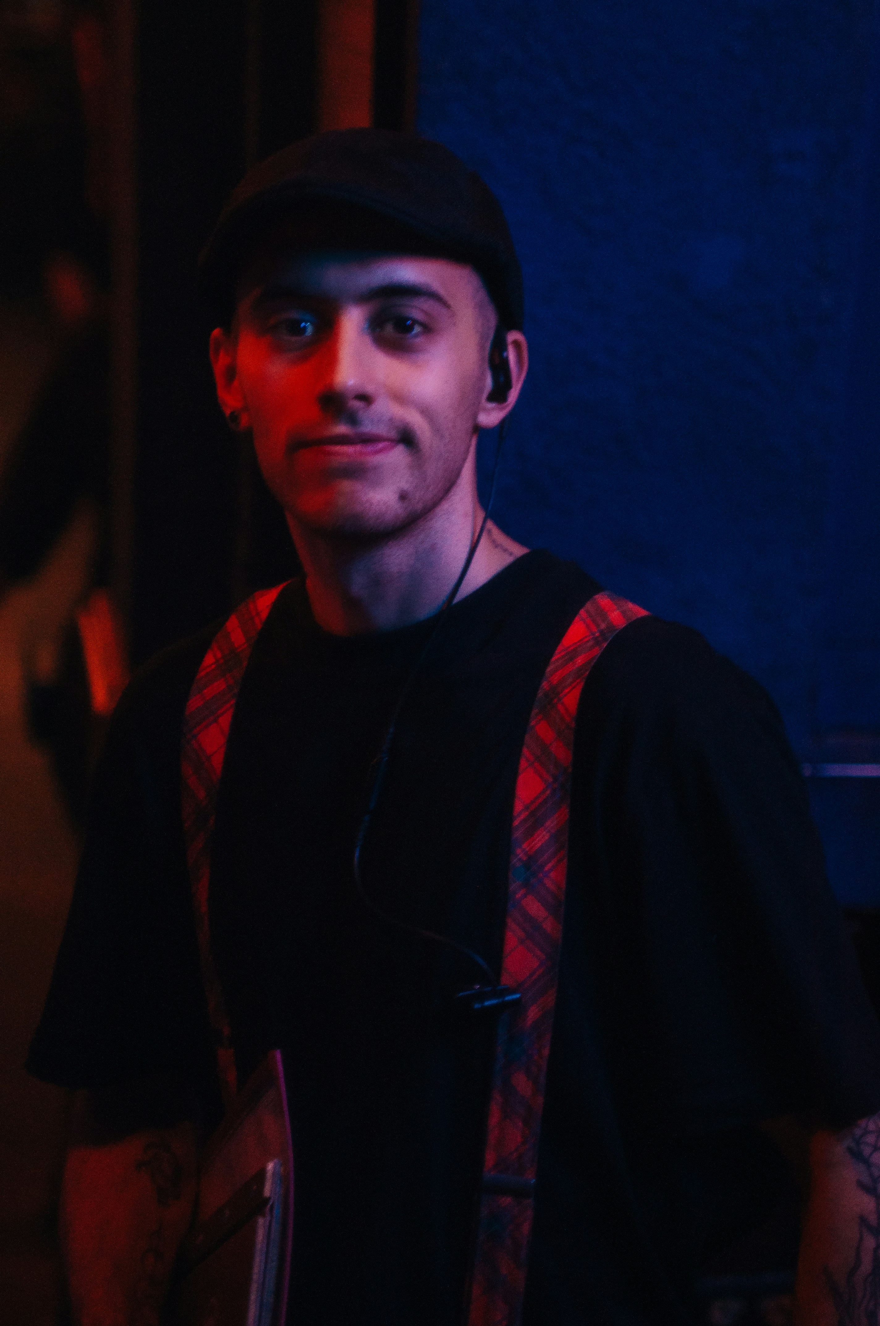 Ph: https://www.instagram.com/mstyazhkin/ | A man standing in a dark room wearing a hat