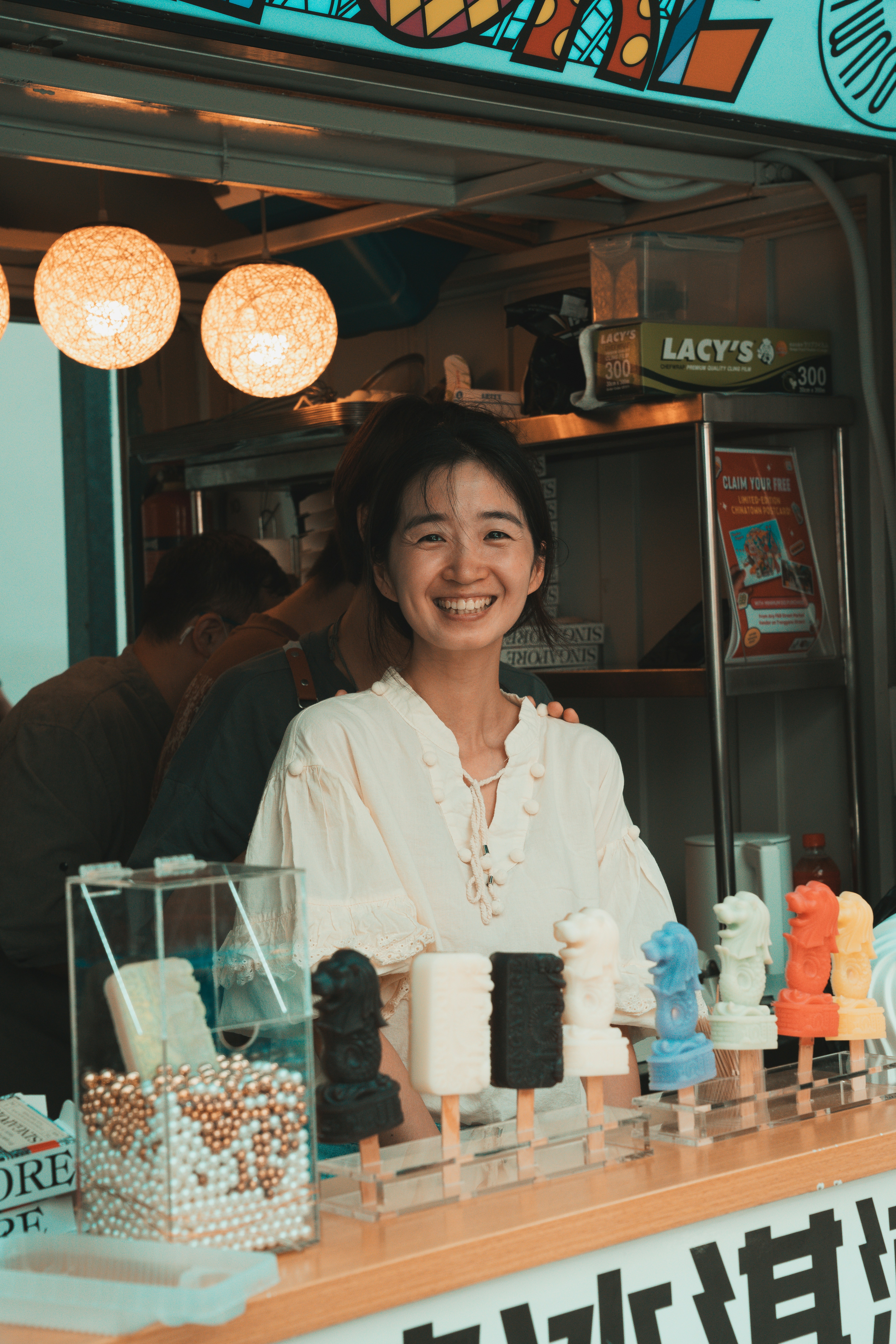 Pastel Pops and a Warm Smile at a Street Ice-Cream Stand