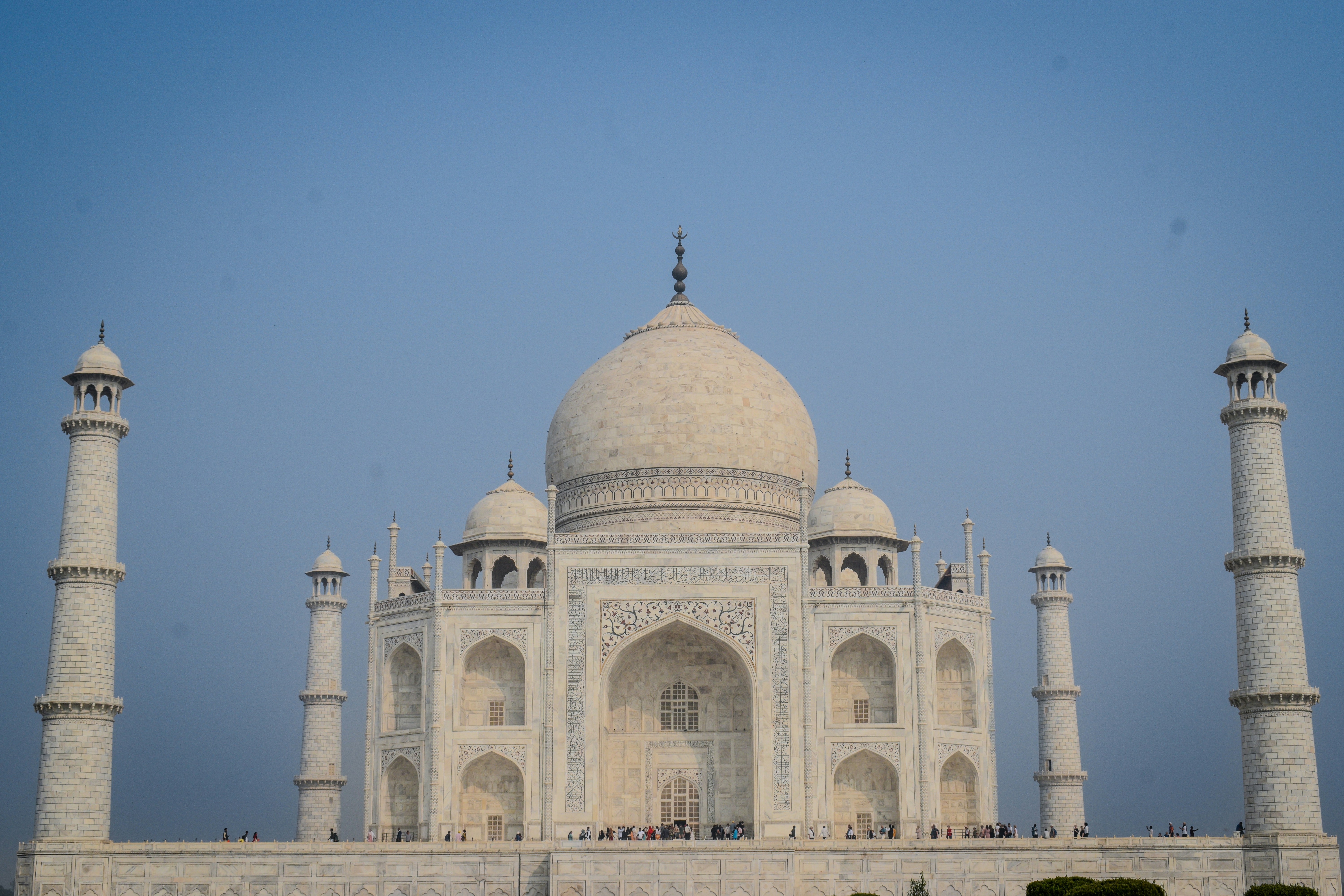 A large white building with many pillars and domes photo – Free India ...