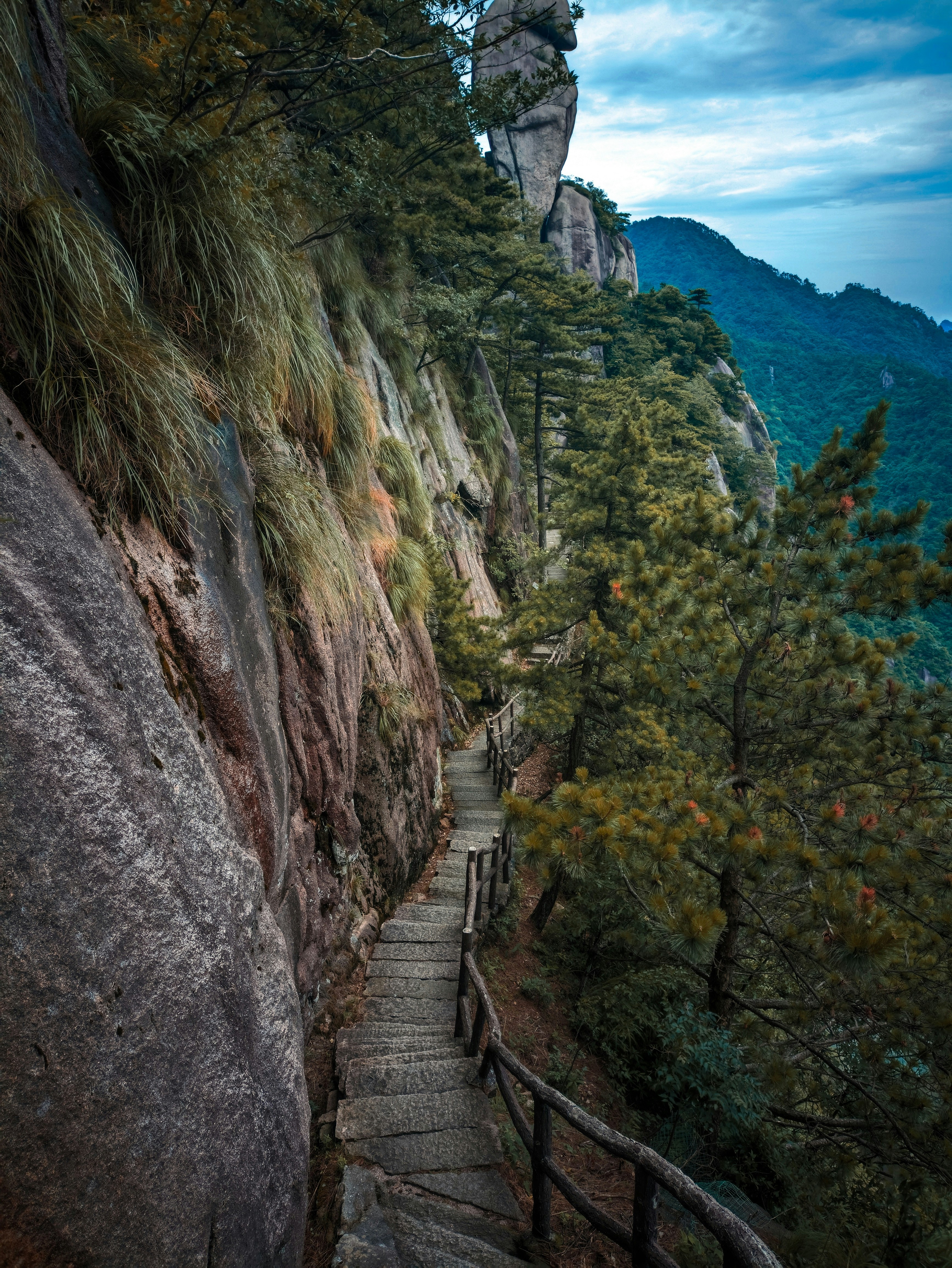 A long narrow path going up the side of a mountain photo – Free Path ...