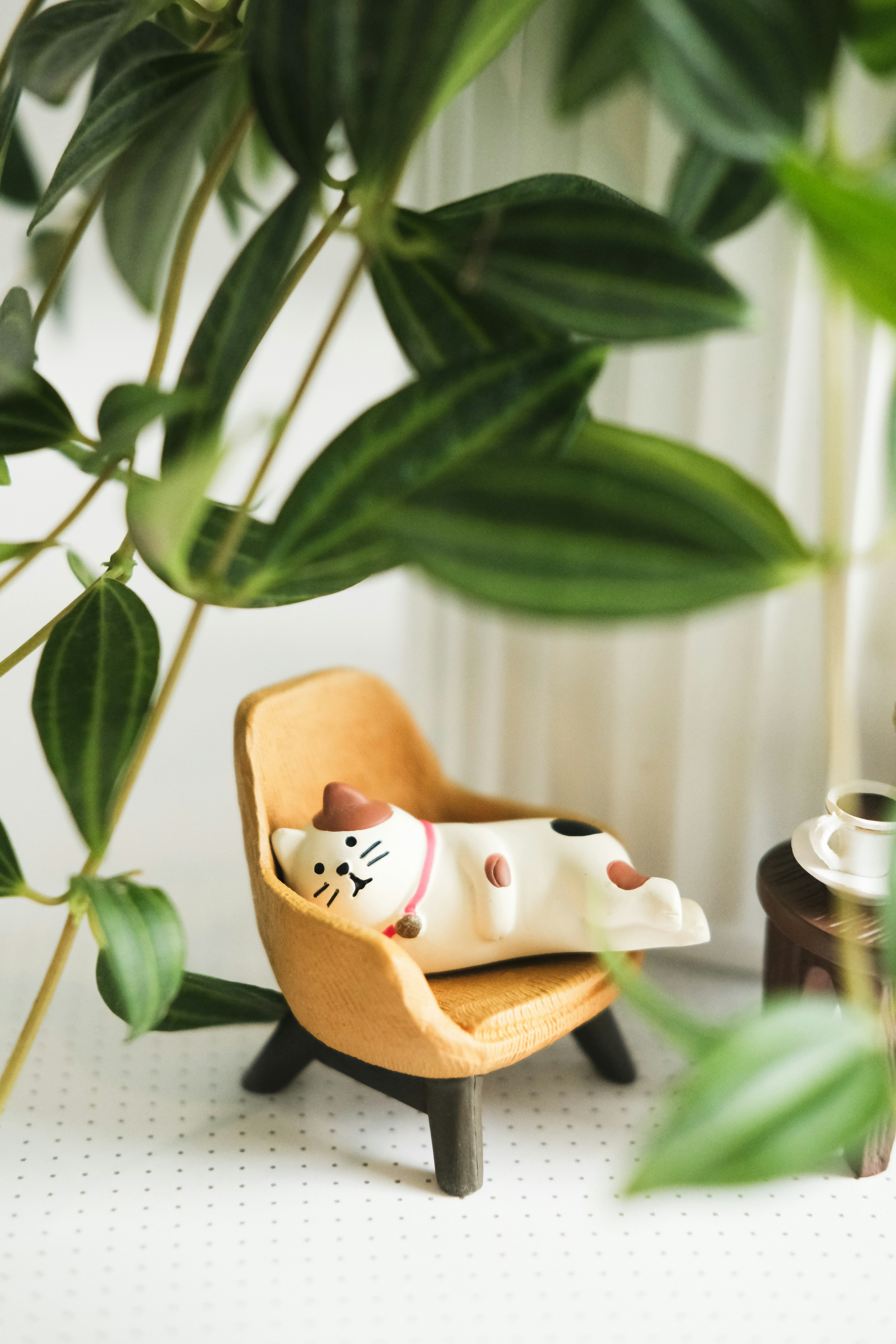 Cozy Cat Nook: A Plush Break in a Leafy Studio