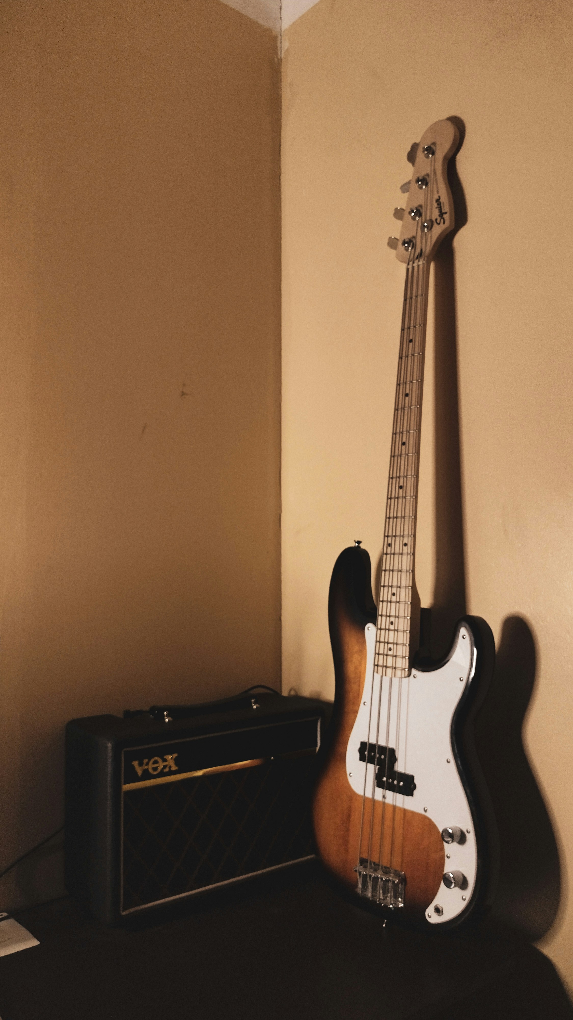 A guitar and amp sitting on a table
