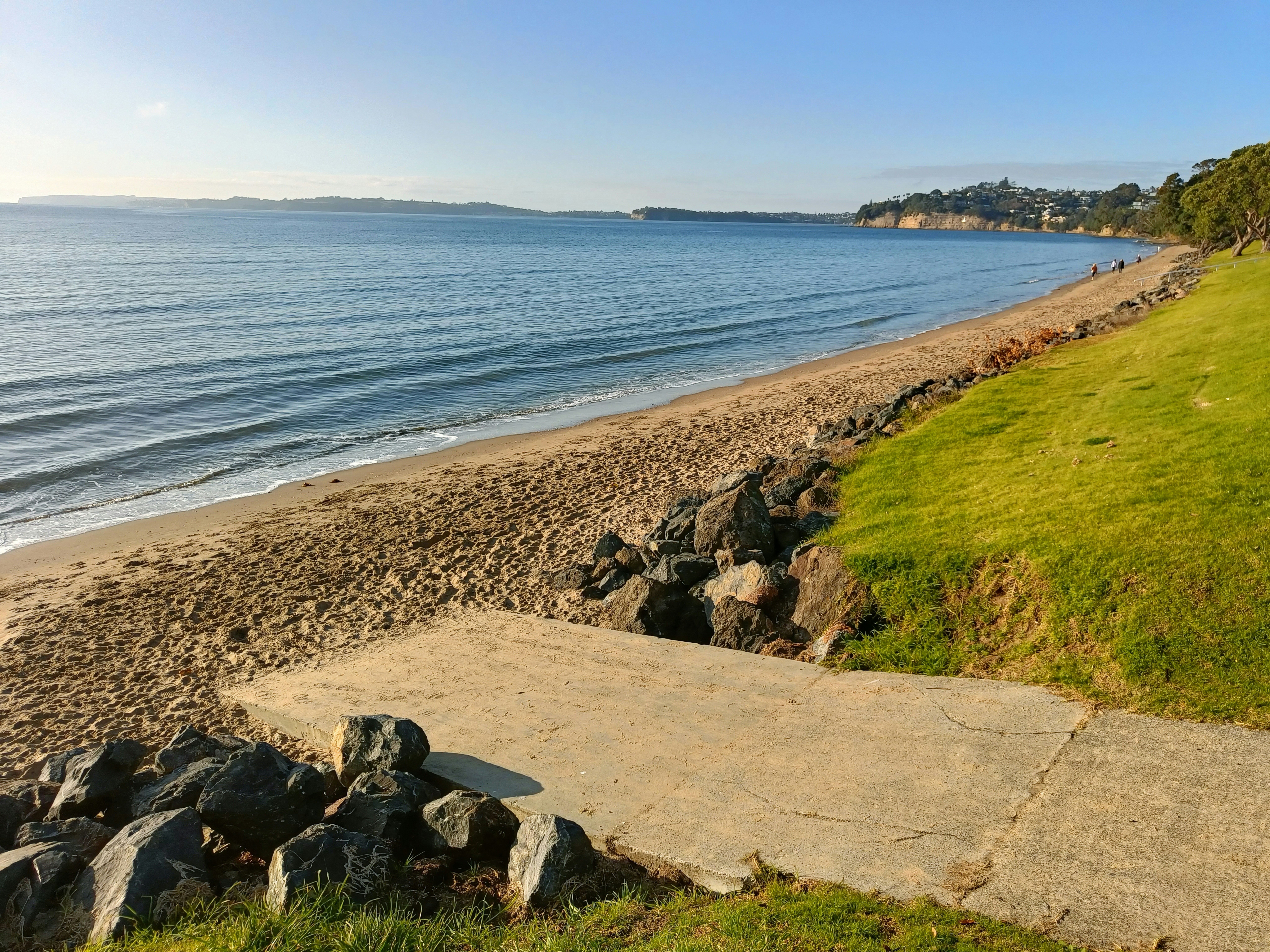 Morning Light Over a Bayfront Breakwater