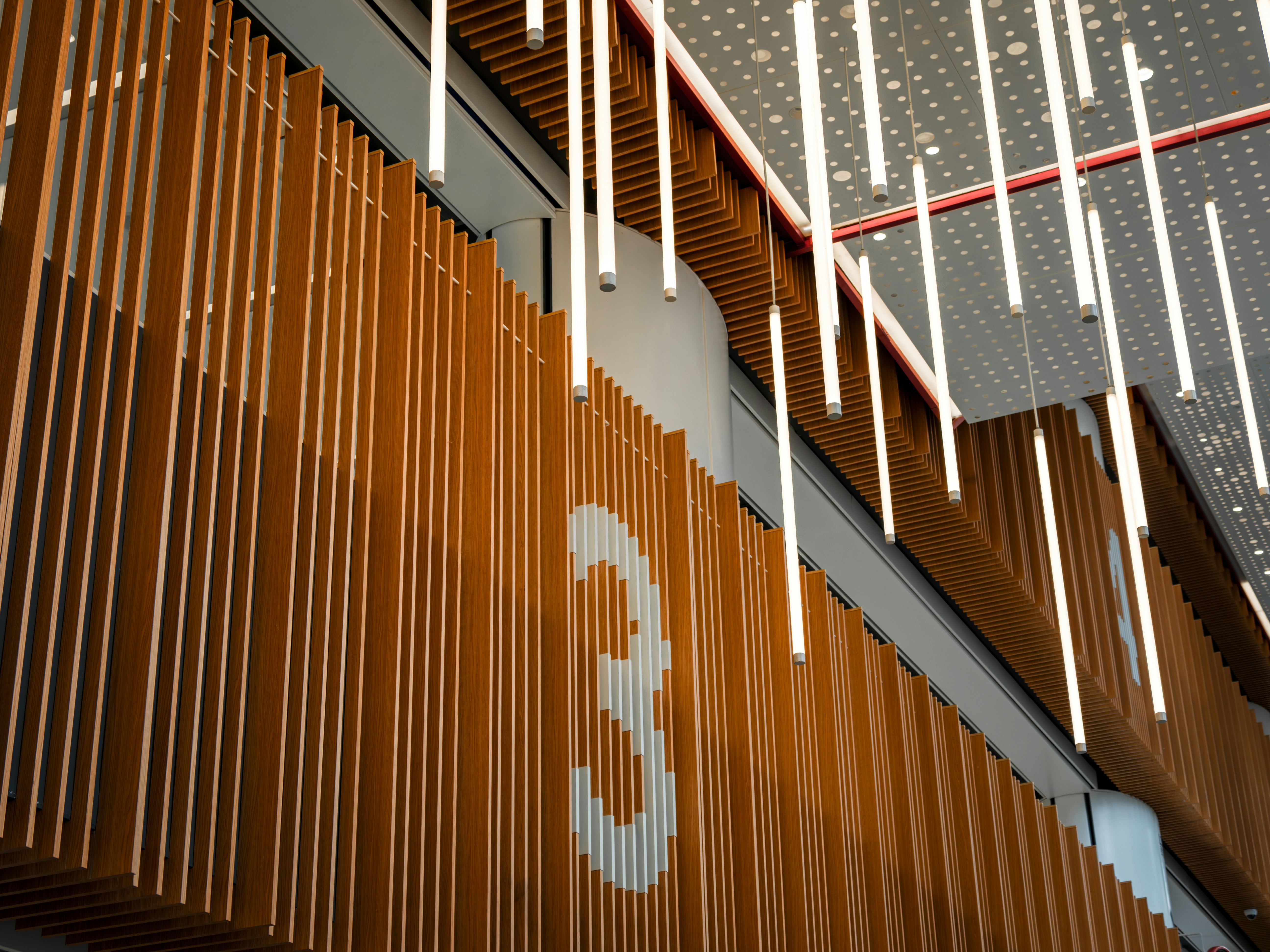 The number eight hanging from the ceiling of a building photo – Free ...