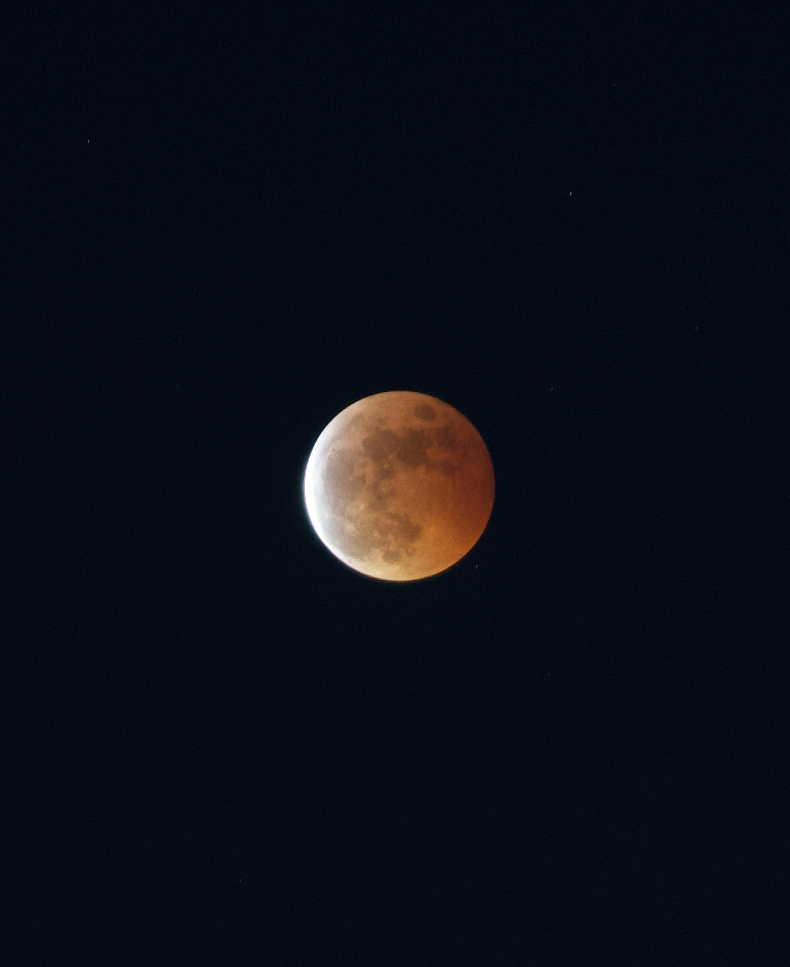 A red moon is seen in the dark sky photo – Free Moon Image on Unsplash