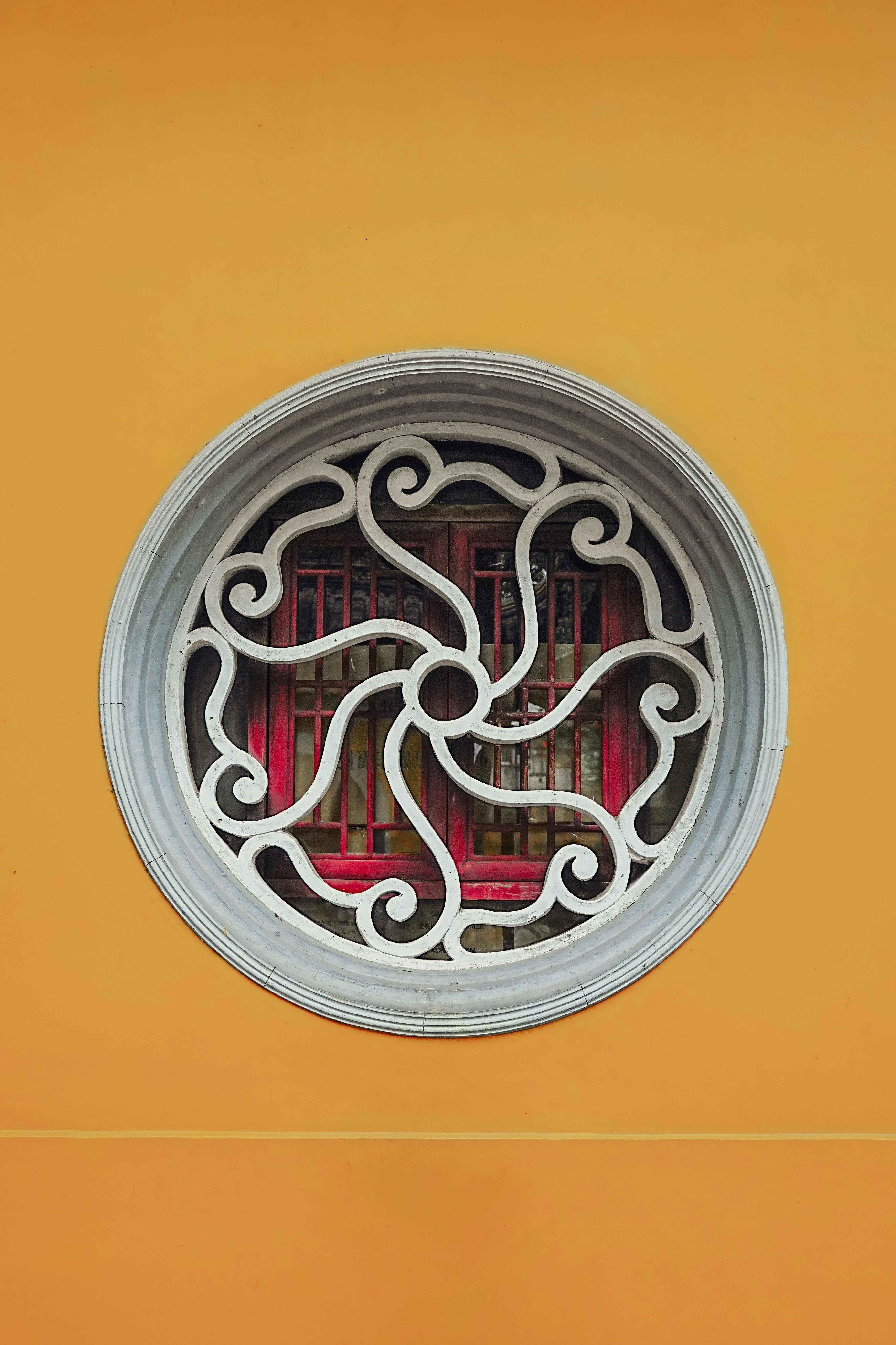 A round window with a decorative design on it photo – Free Suzhou Image ...