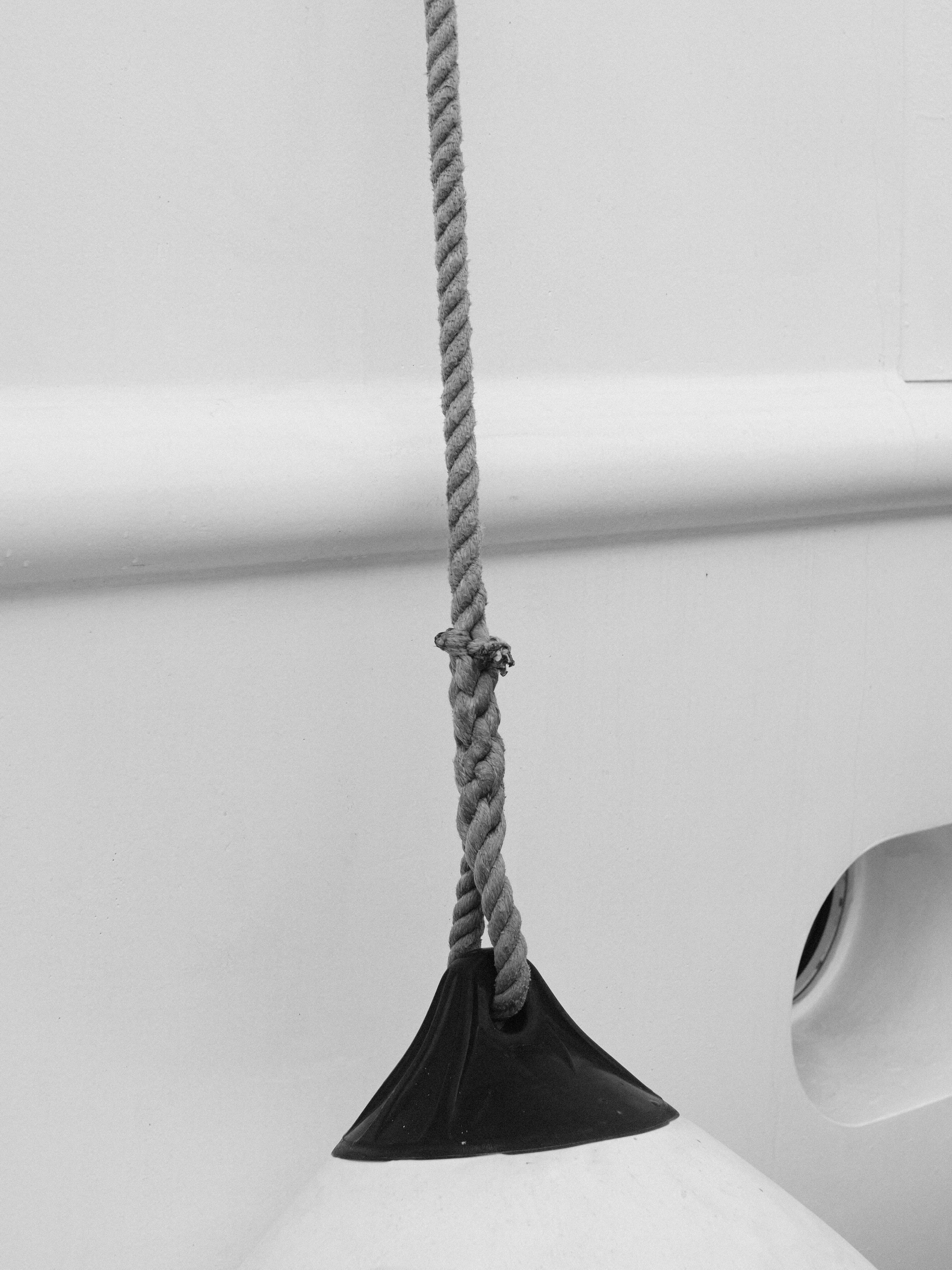 A white toilet with a rope attached to it photo – Free Texture Image on ...