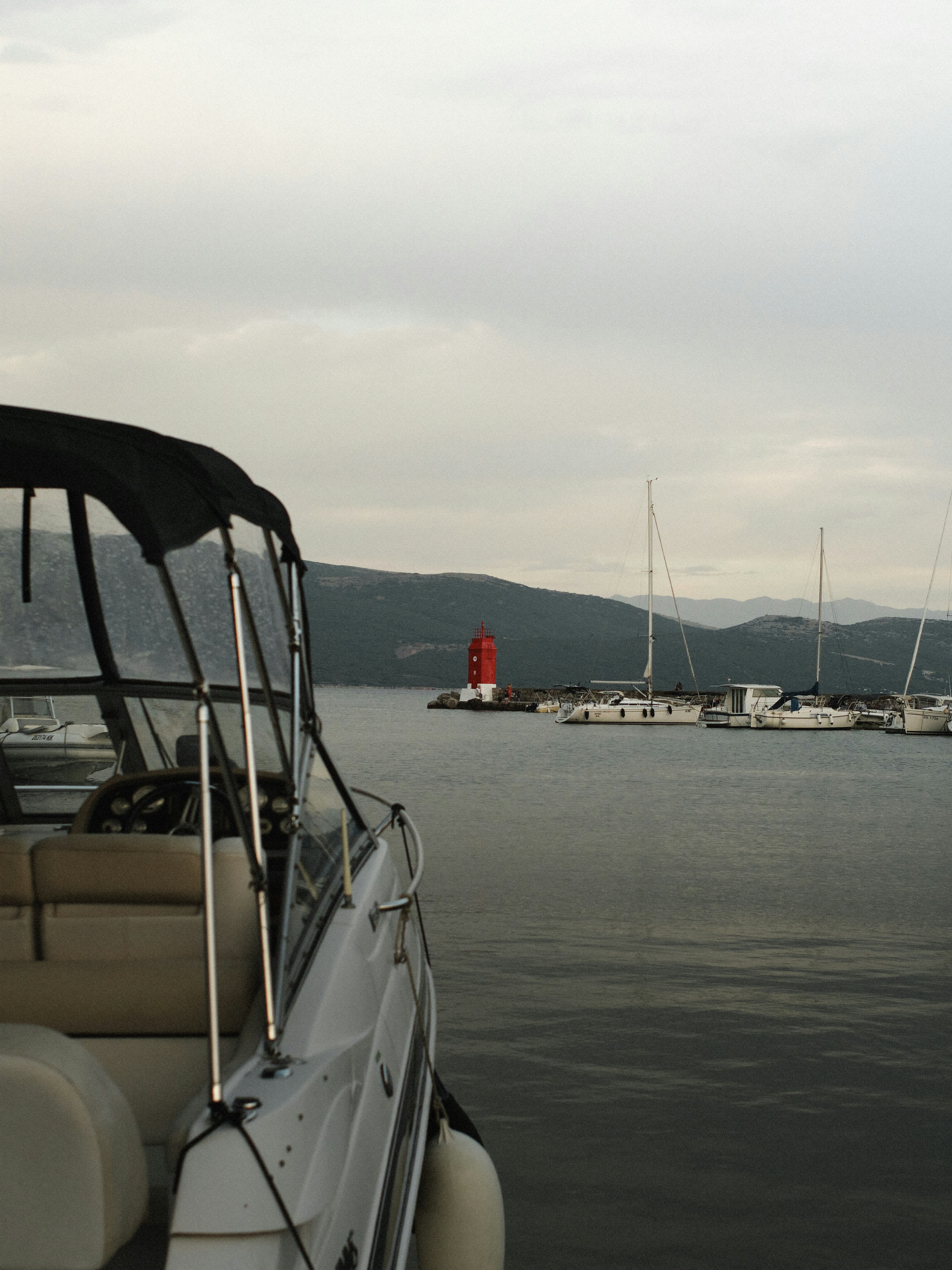 Red Beacon Over a Quiet Harbor