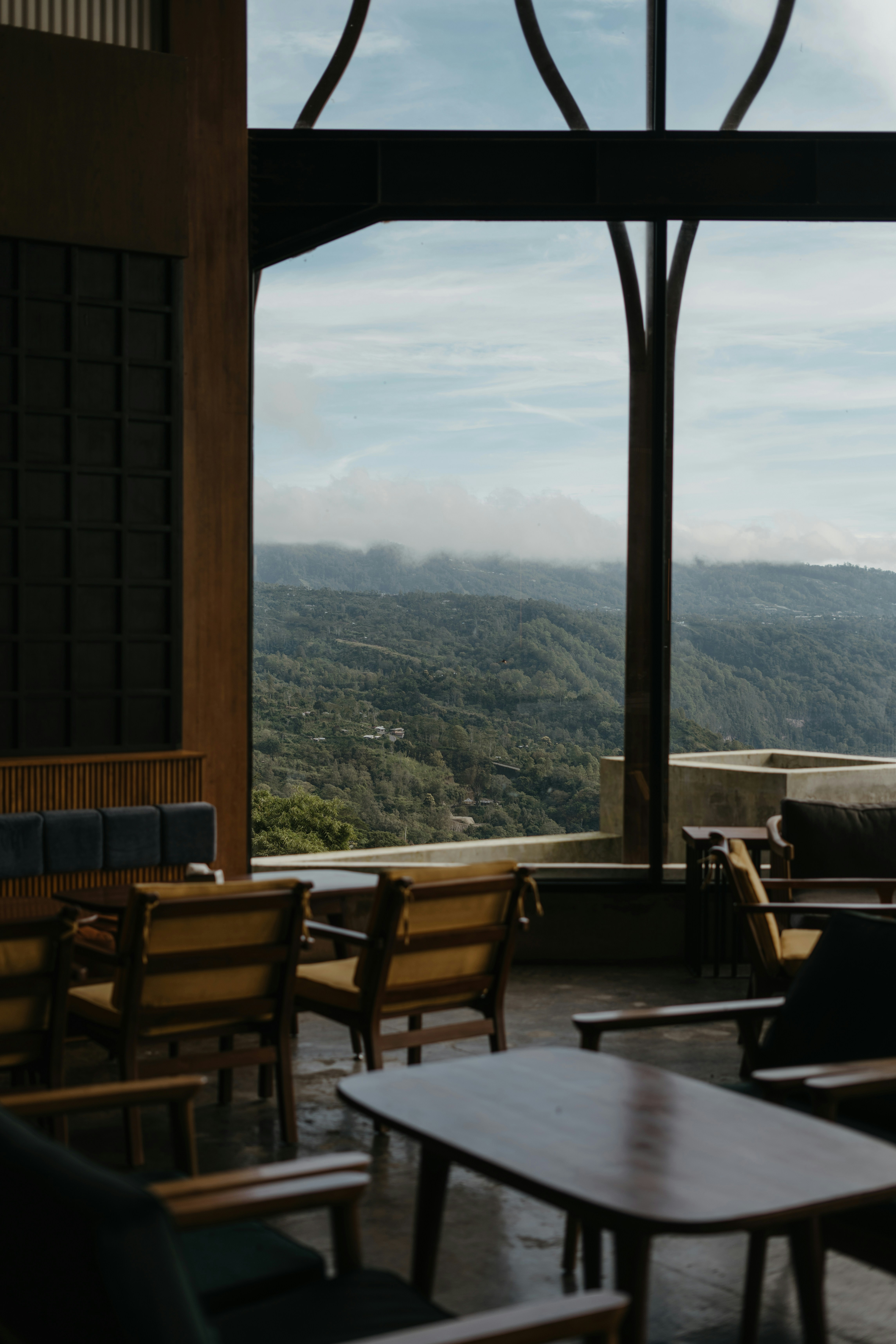 Arching Glass Overlook: A Quiet Terrace with Valley View