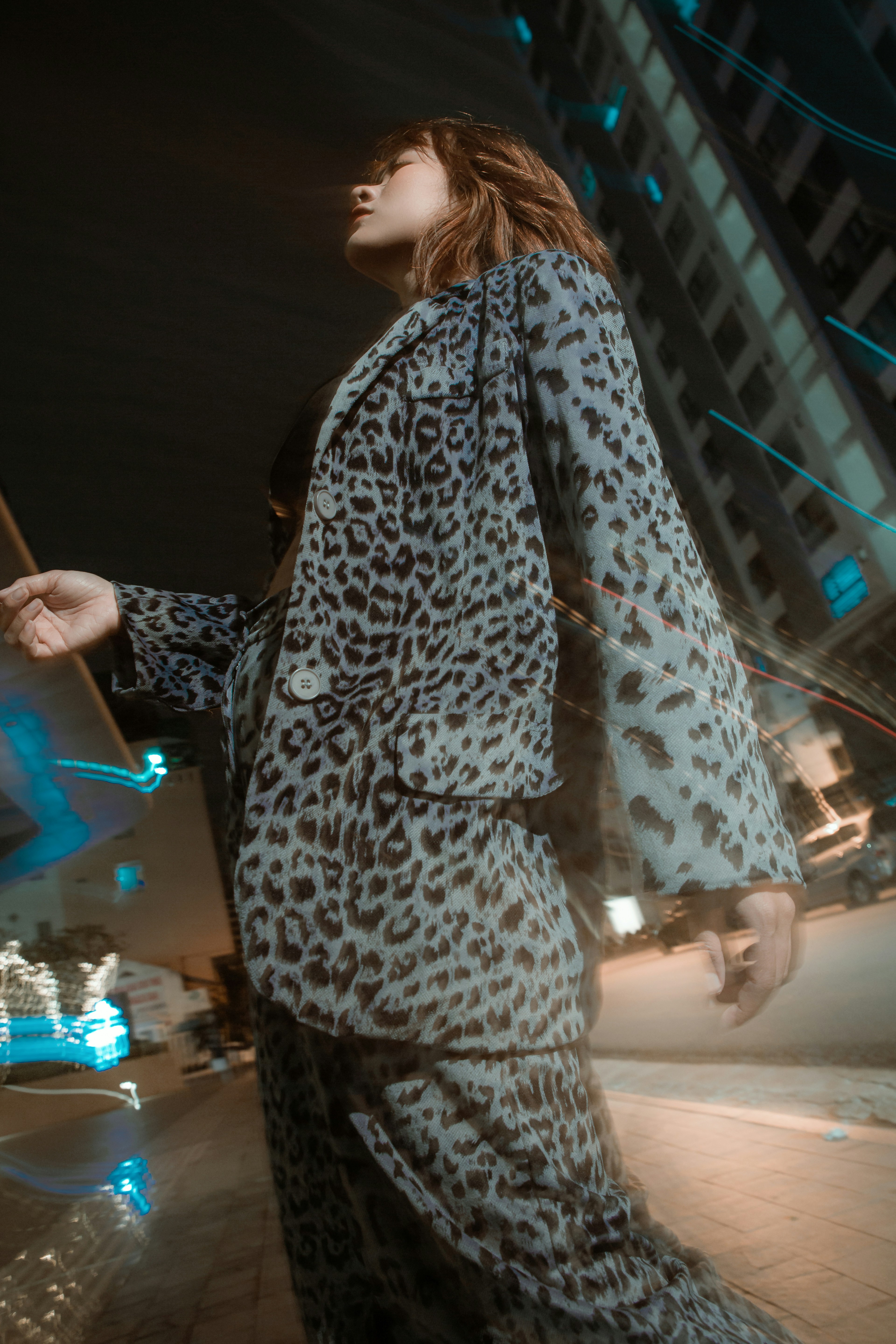 Leopard-Patterned Confident Walk Under Neon Night