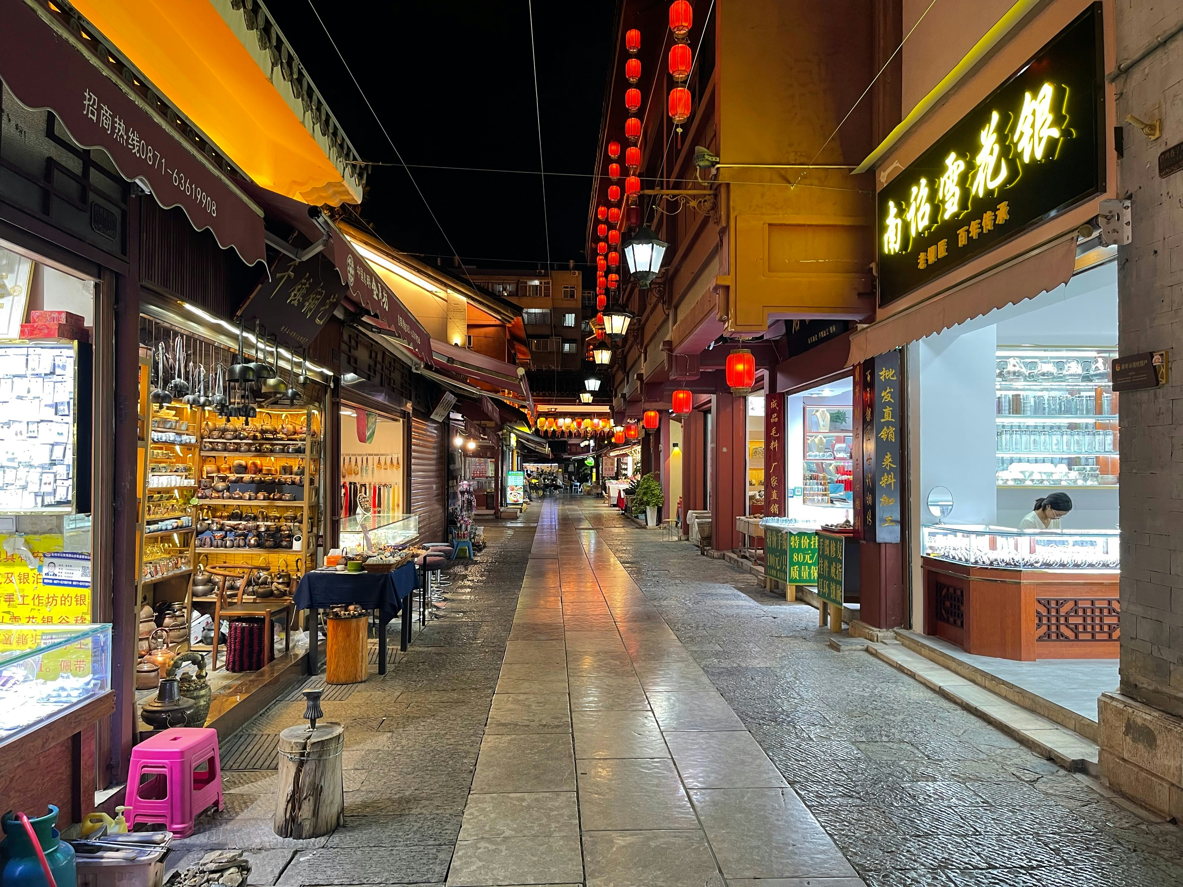 Lantern-Lit Alleyway: A Night Market Corridor Framed by Glowing Signs