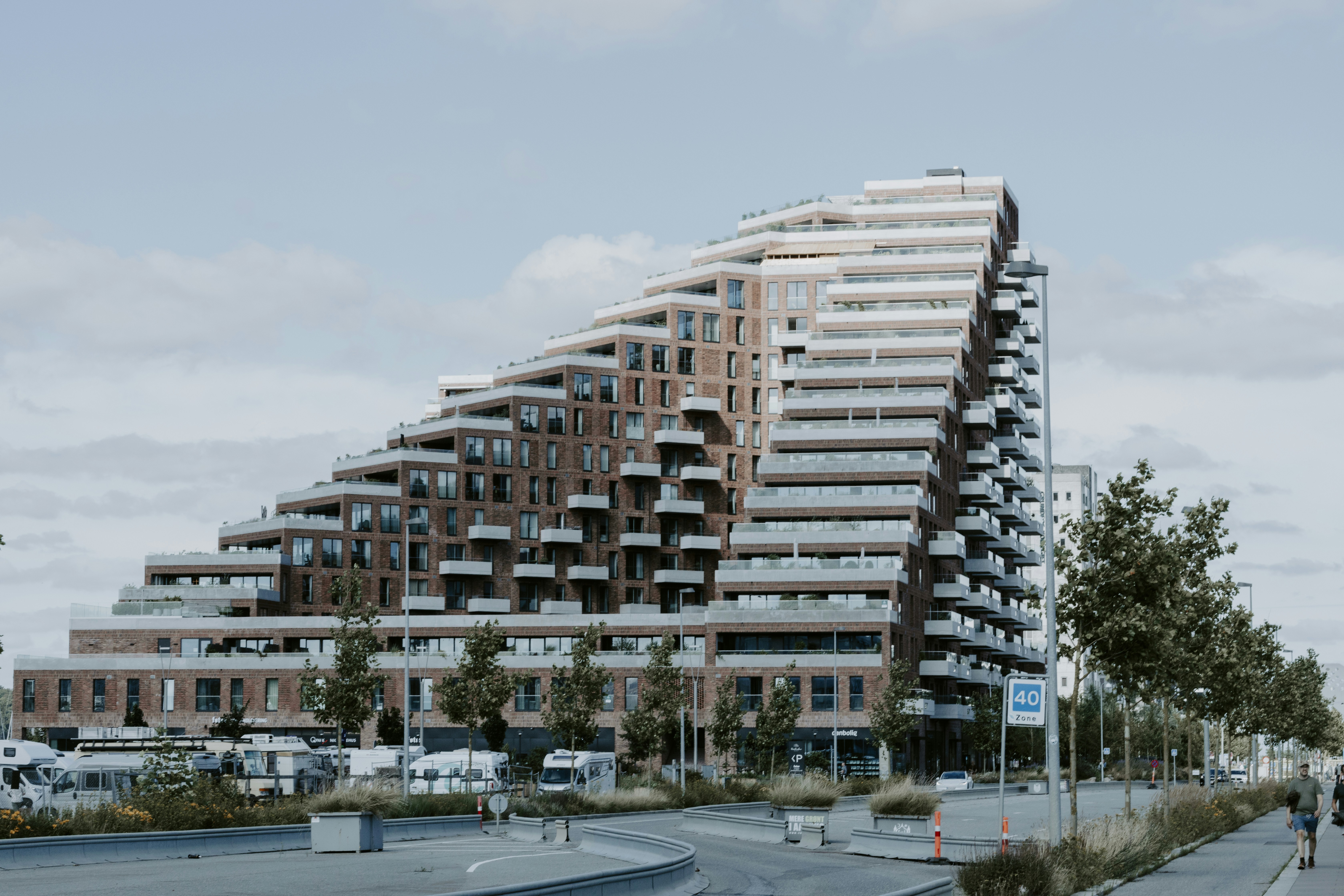 A very tall building sitting on the side of a road photo – Free Aarhus ...