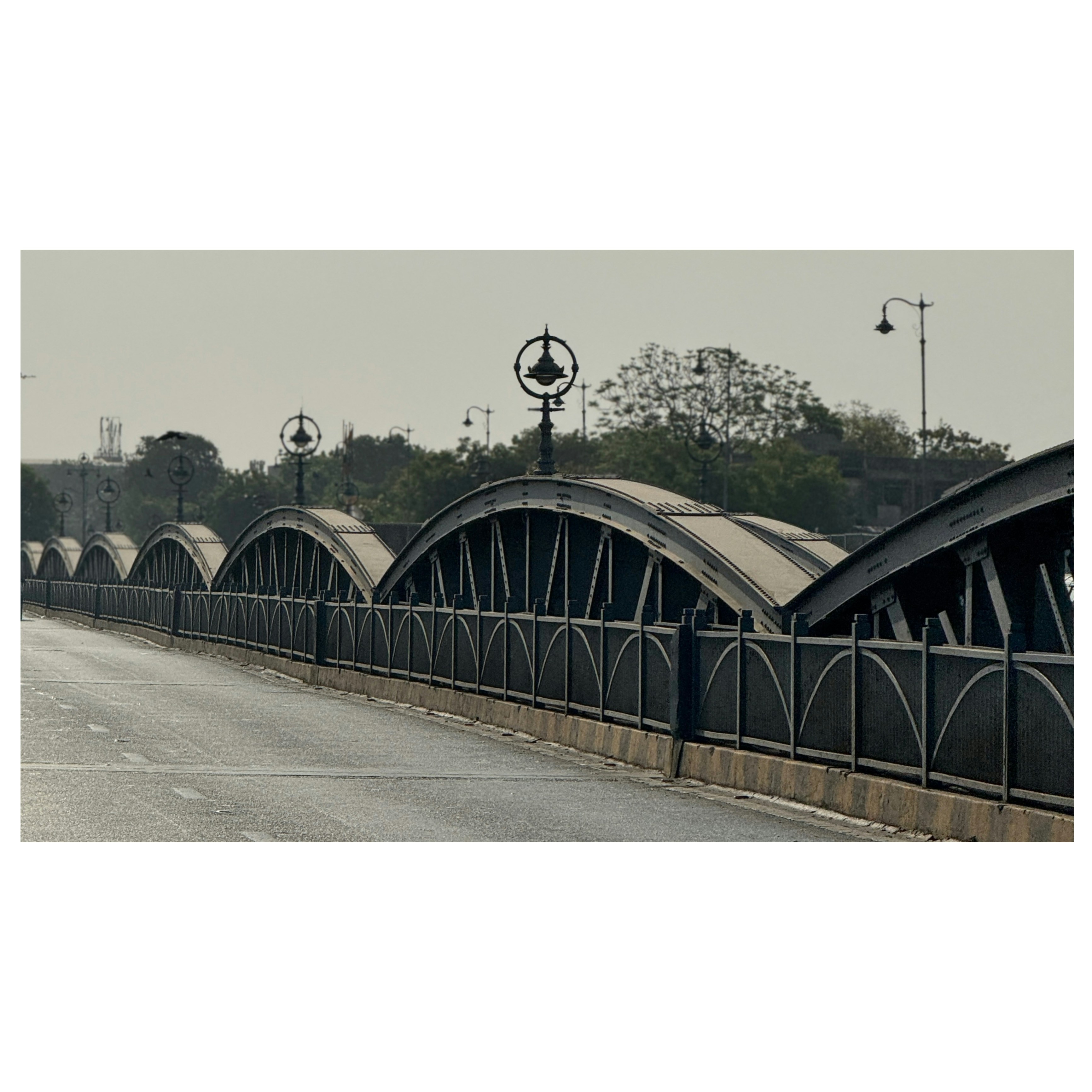 A picture of a bridge over a street photo – Free Ellis bridge Image on ...