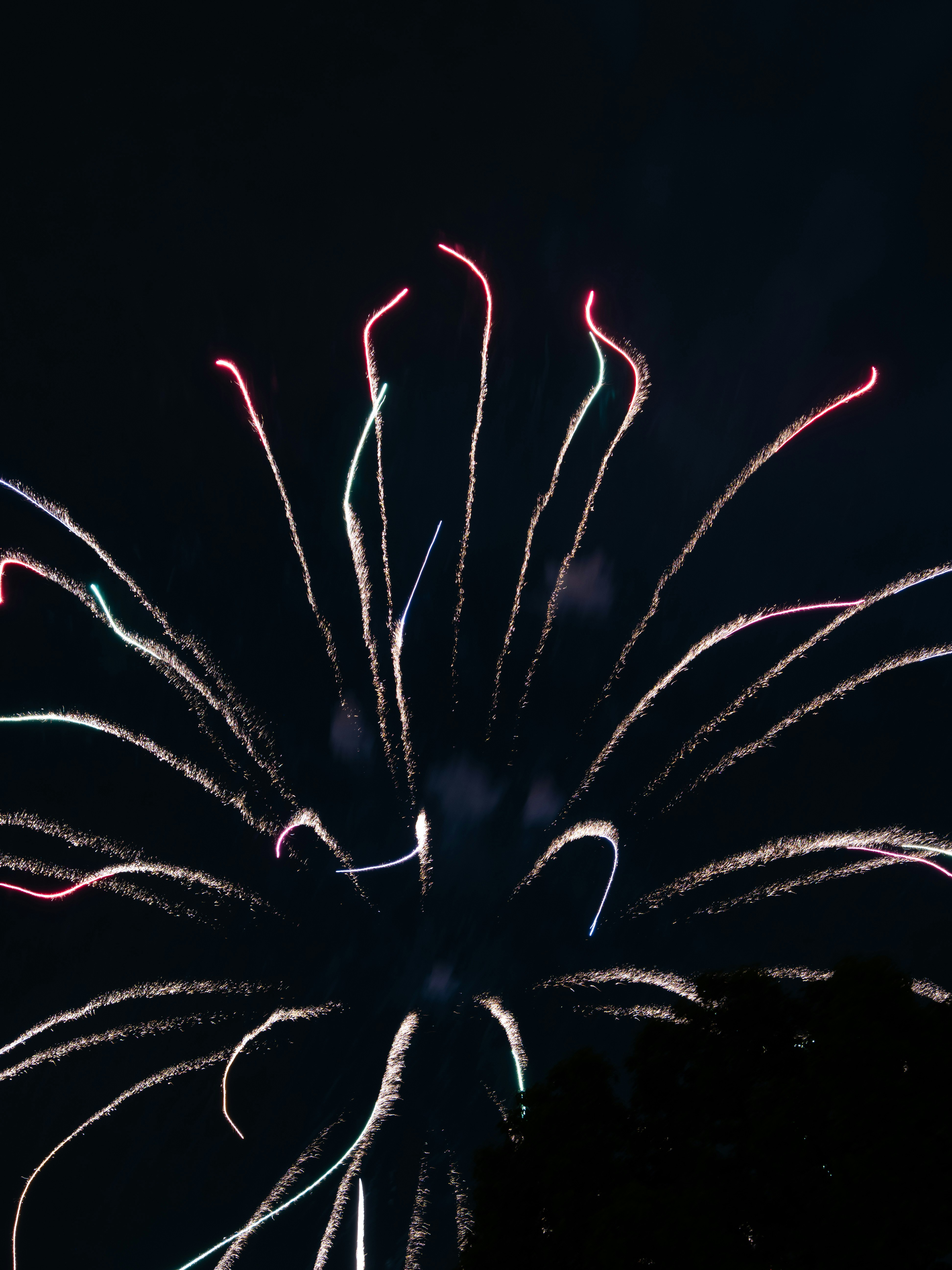A large fireworks is lit up in the night sky photo – Free Fireworks ...