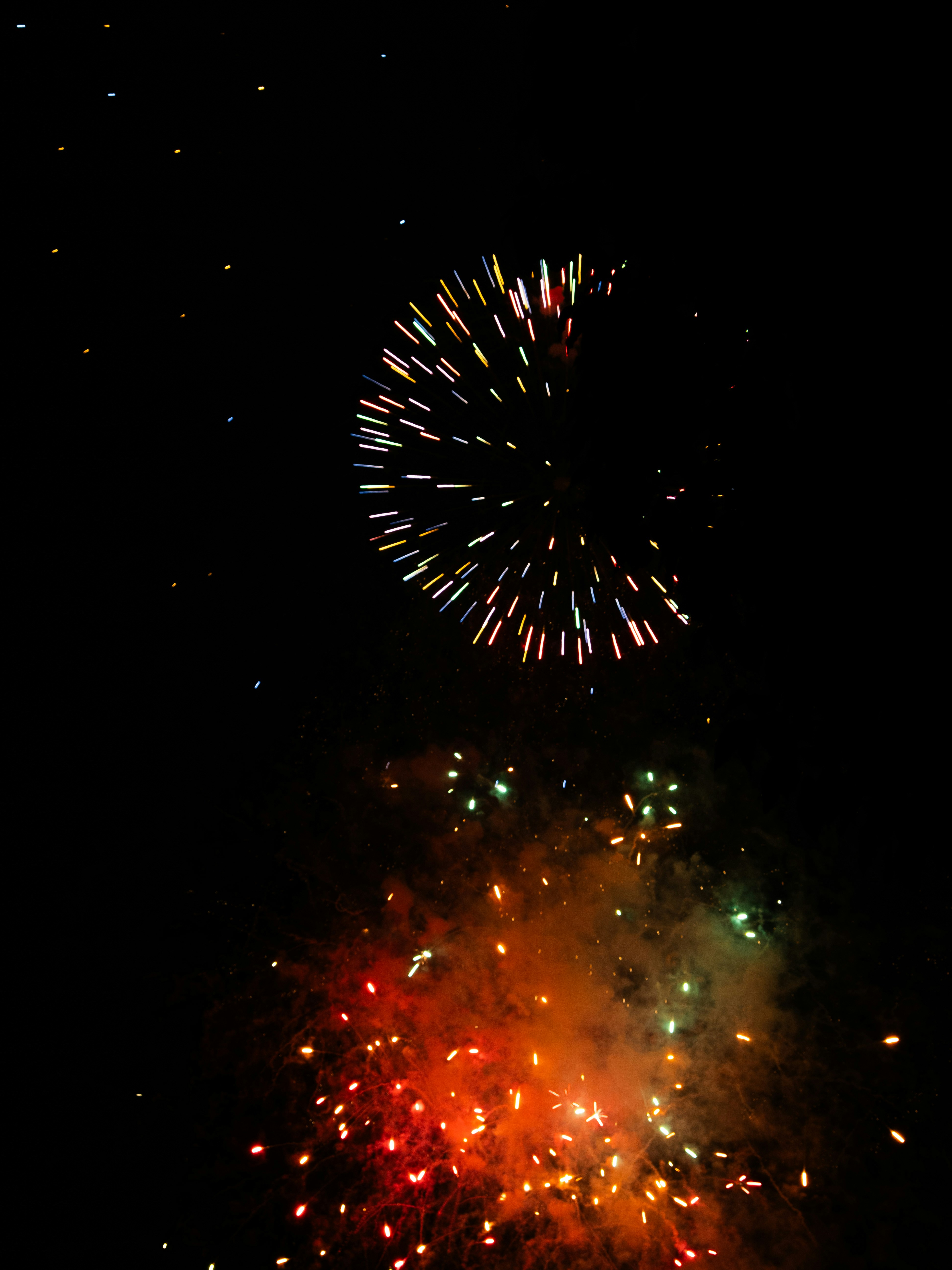 A firework is lit up in the night sky photo – Free Fireworks Image on ...