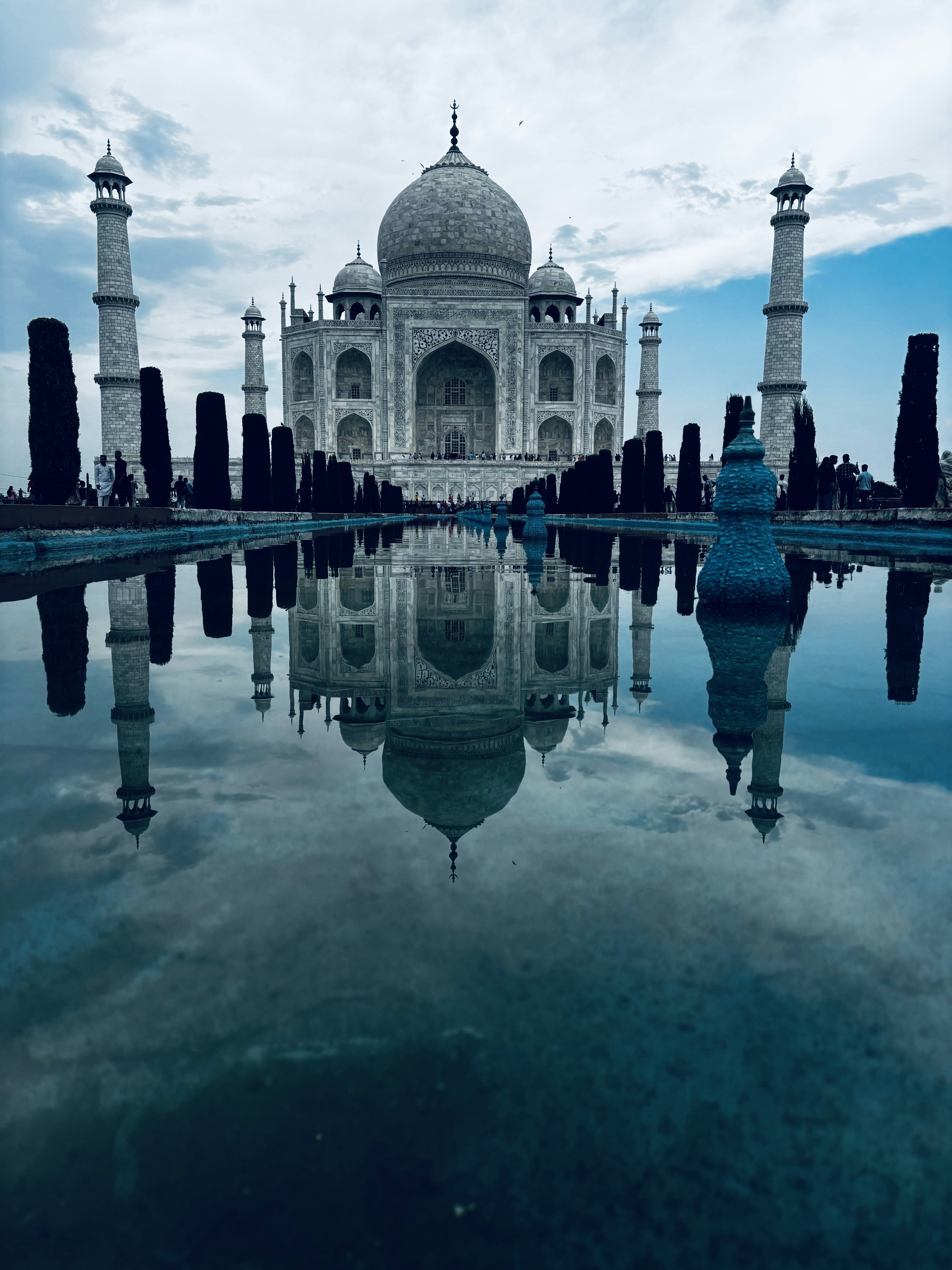 Blue Mirror: Taj Mahal's Quiet Symmetry Over a Glassy Pool