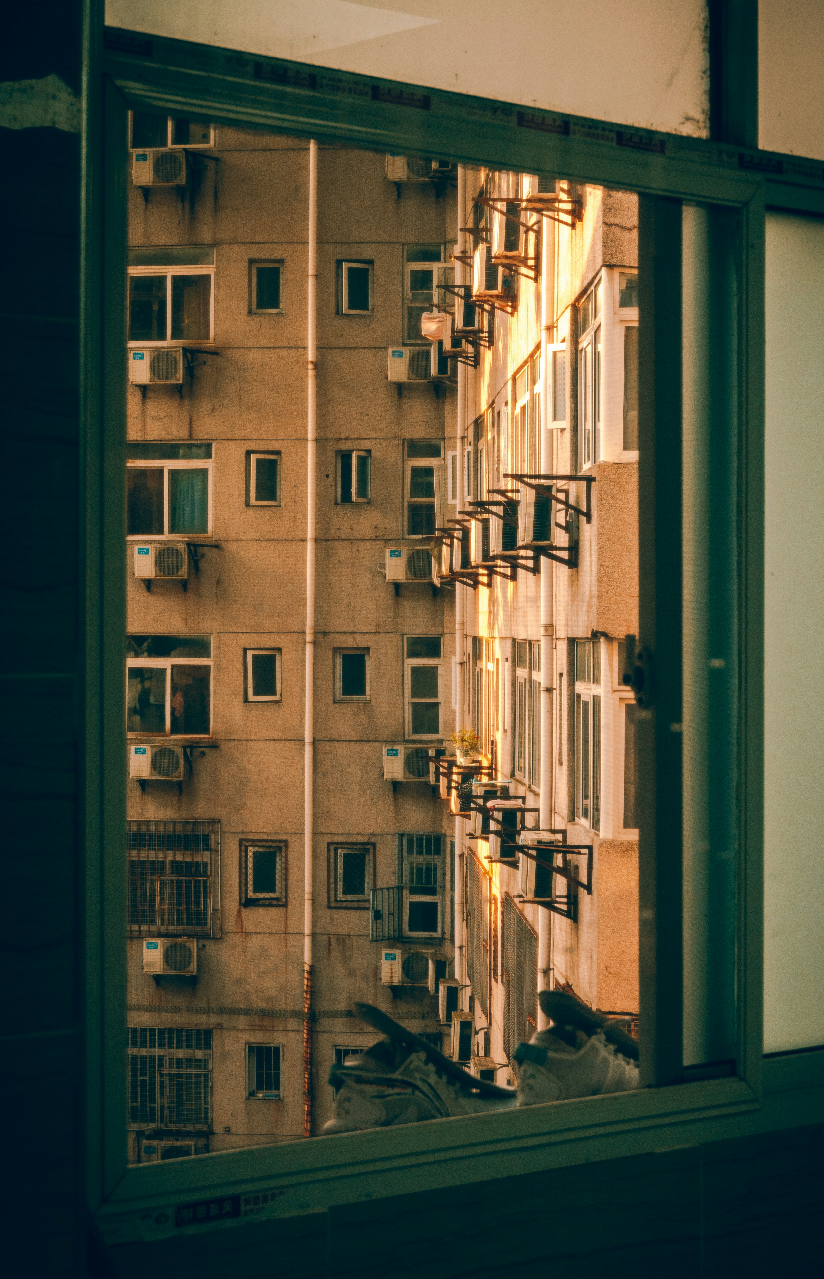 A view of a building through a window photo – Free China Image on Unsplash
