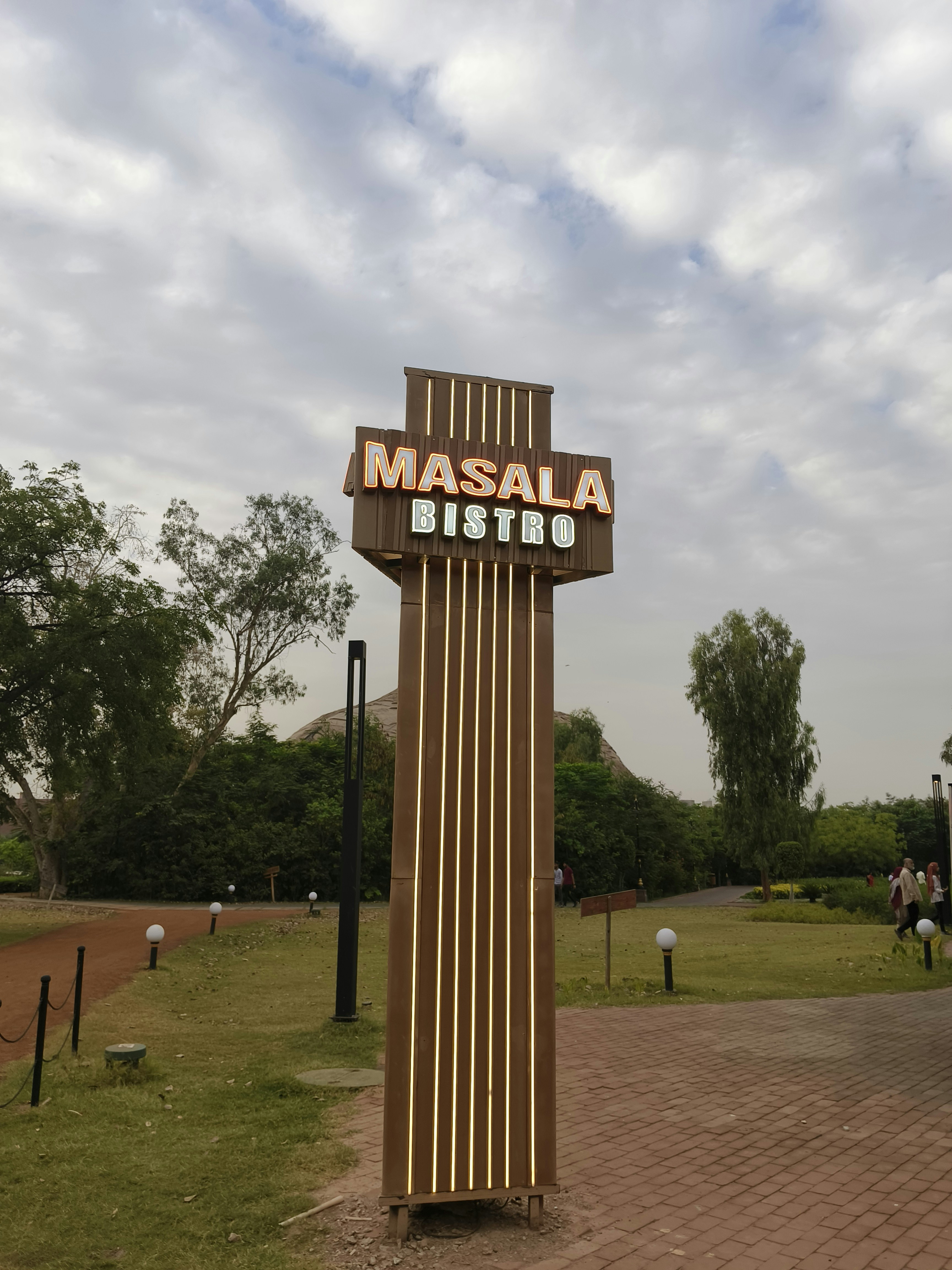 A sign that says masala bistro on it photo – Free Cafe Image on Unsplash