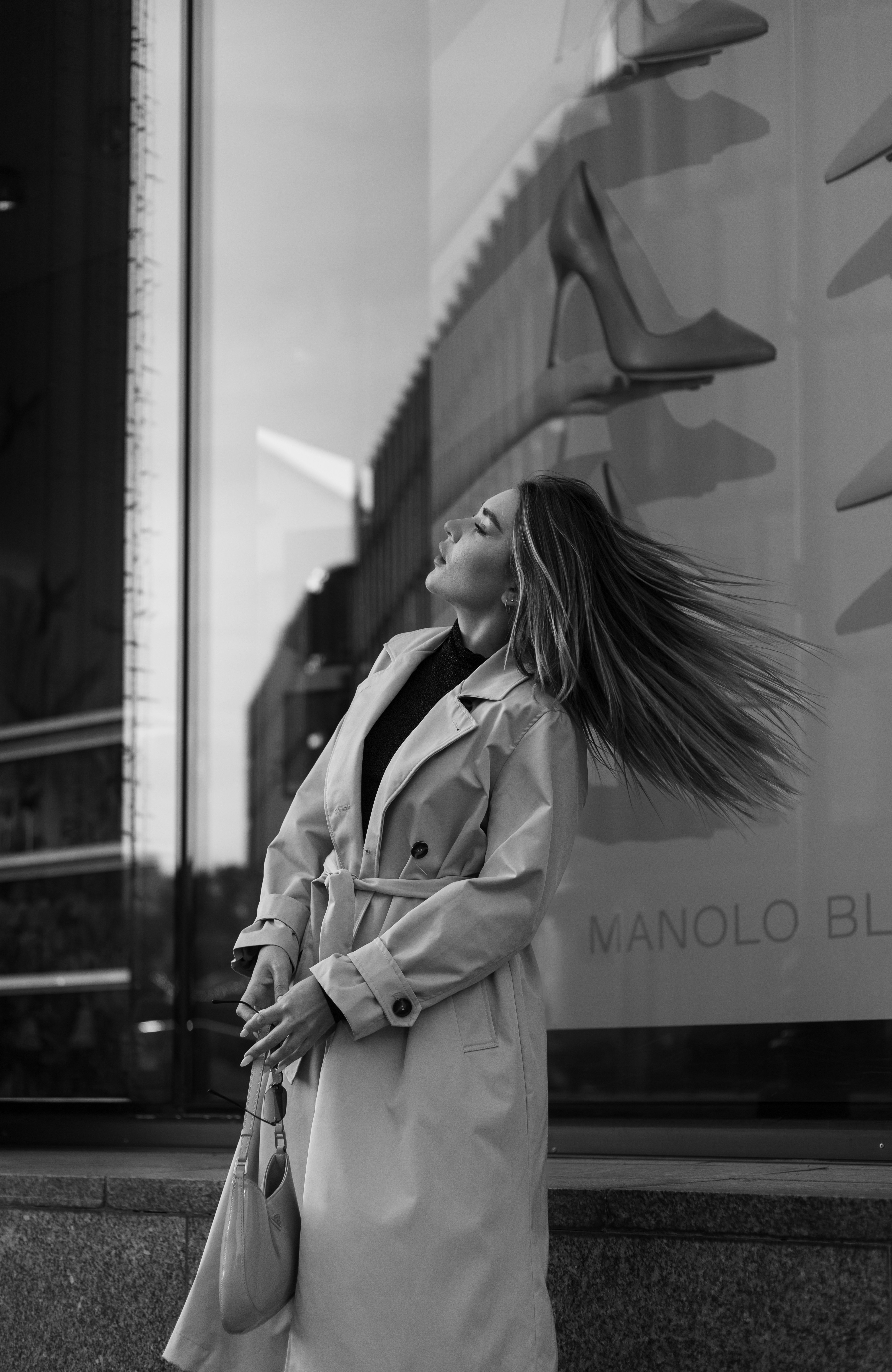Wind-Tossed Trench by the Manolo Blahnik Window