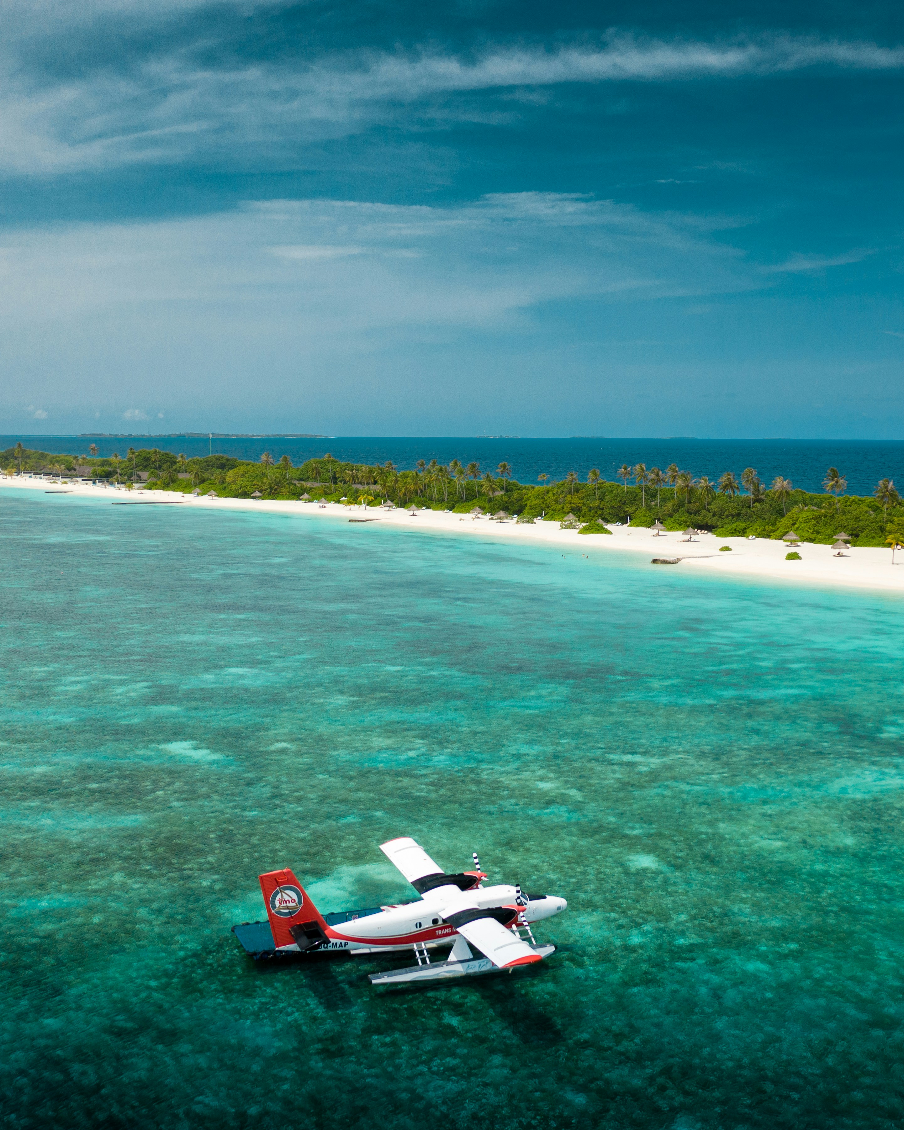 Seaplane at the Edge of a Turquoise Caribbean Lagoon