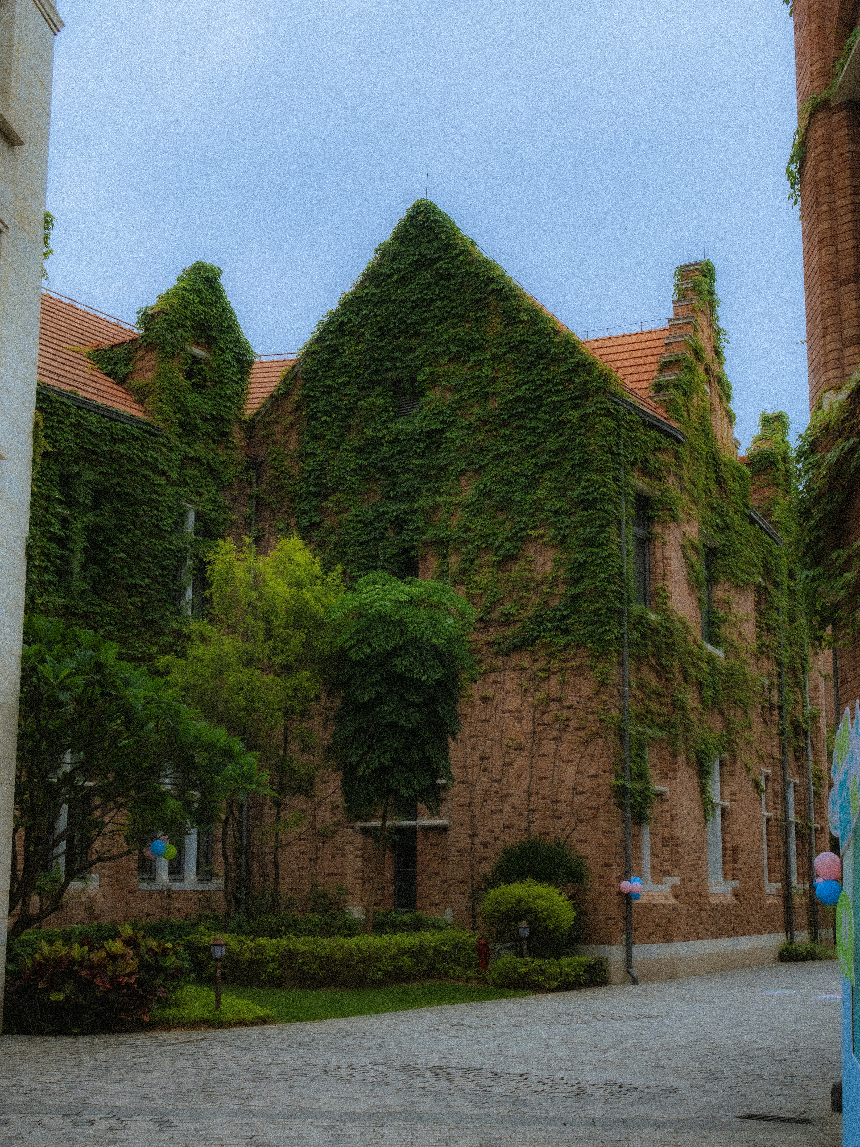 Ivy-Crowned Gable in a Brick Courtyard