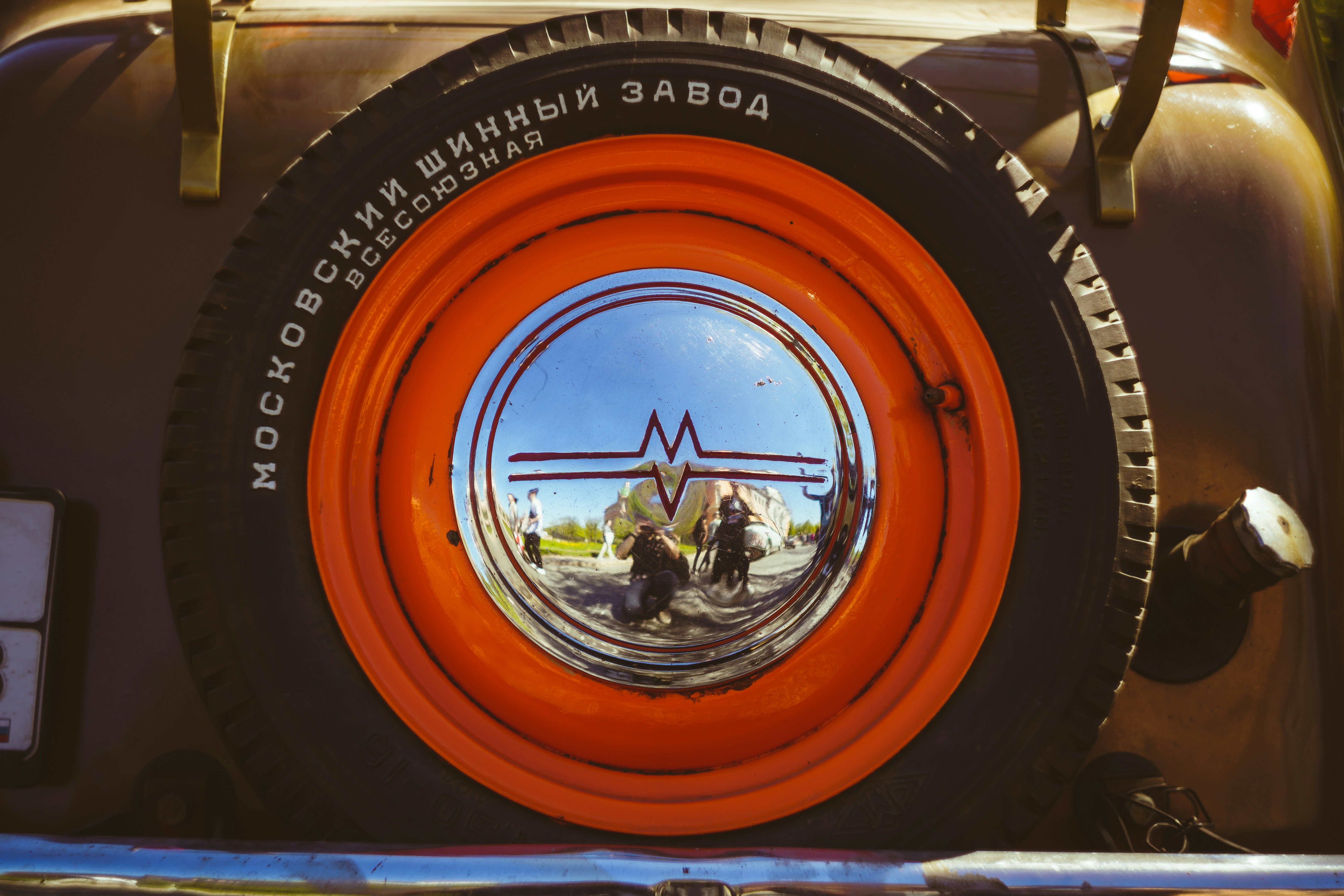 Hubcap Mirror: Reflections Within a Vintage Tire Ring