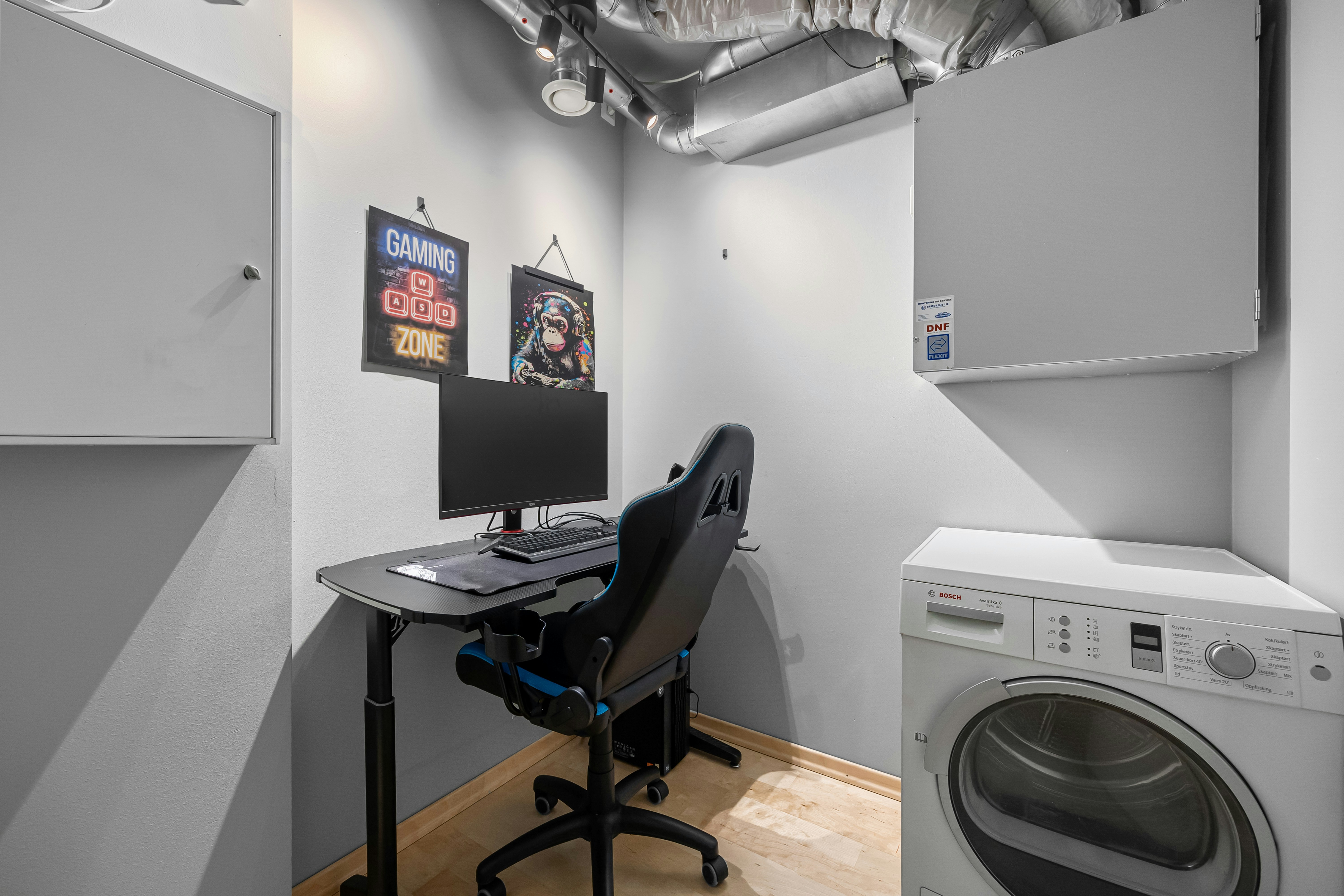 A room with a desk and a washer and dryer photo – Free Appliance Image ...