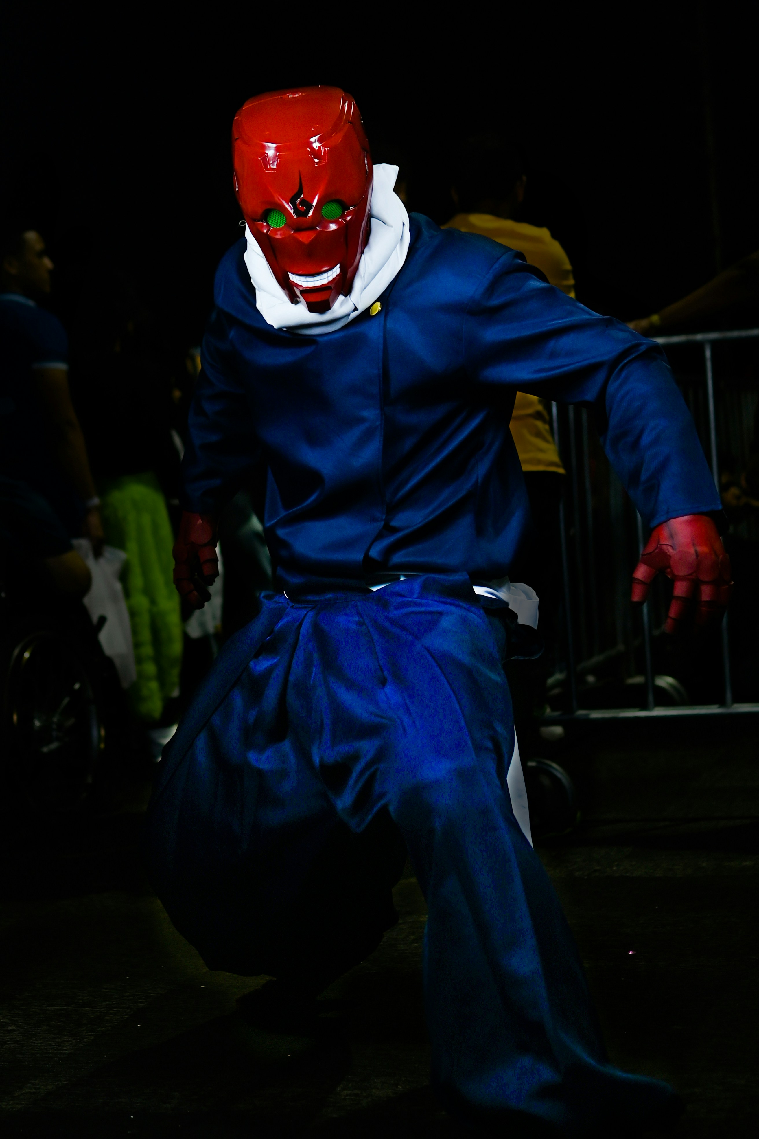 Midnight Stride: Red-Masked Warrior in a Flowing Blue