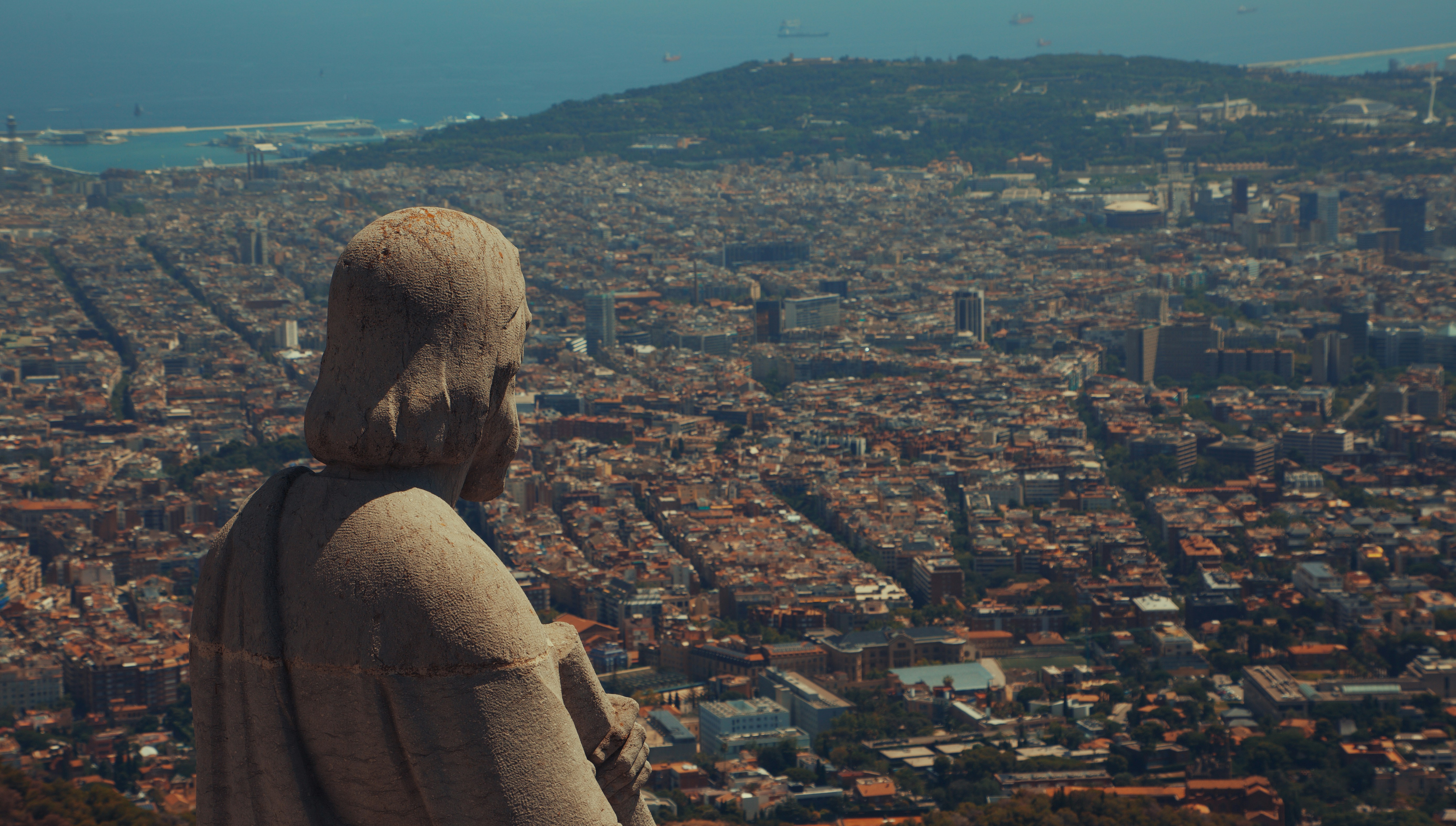 Stone Sentinel Over a Sea of Terracotta Rooftops