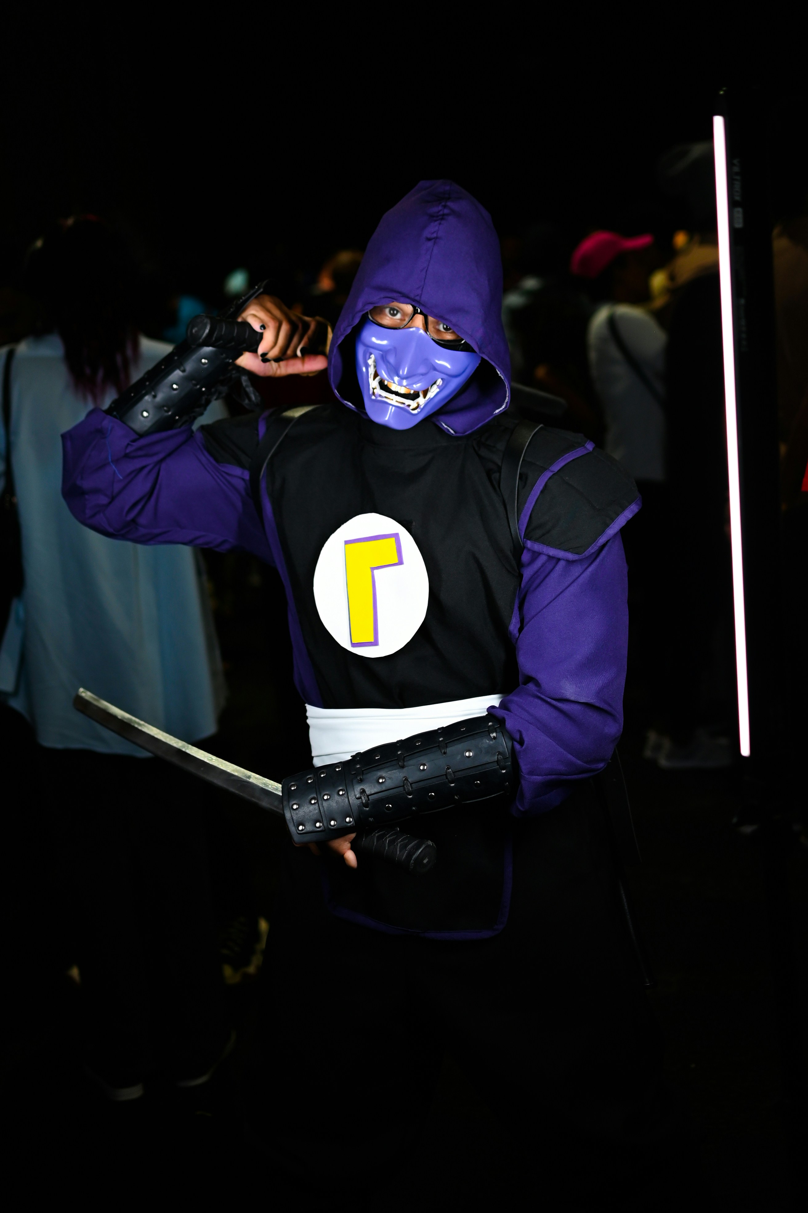 Neon-Forged Stance: The Purple Knight at the Convention