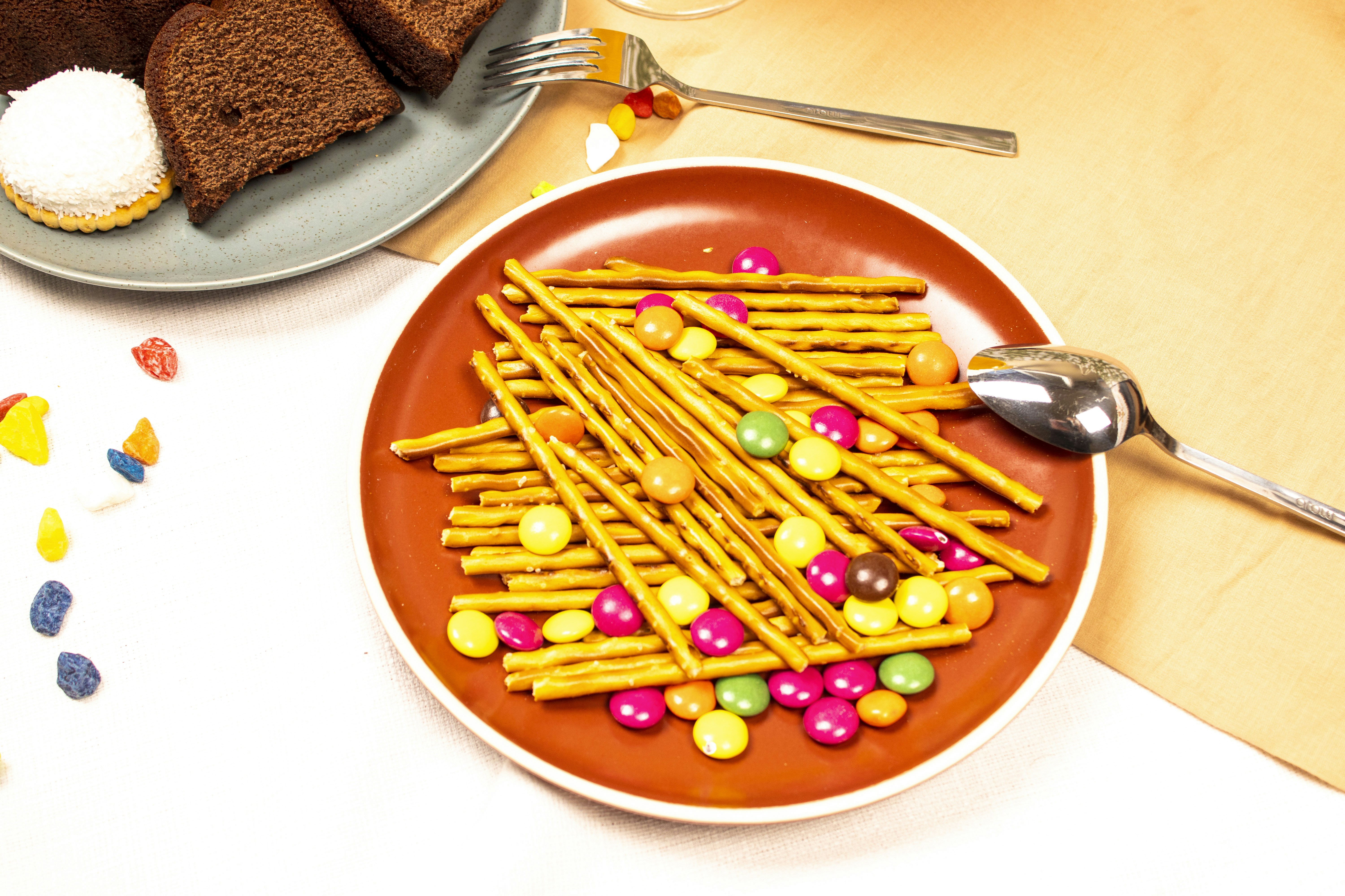 Terracotta Crunch: Pretzel Sticks Meet Colorful Candy Beads