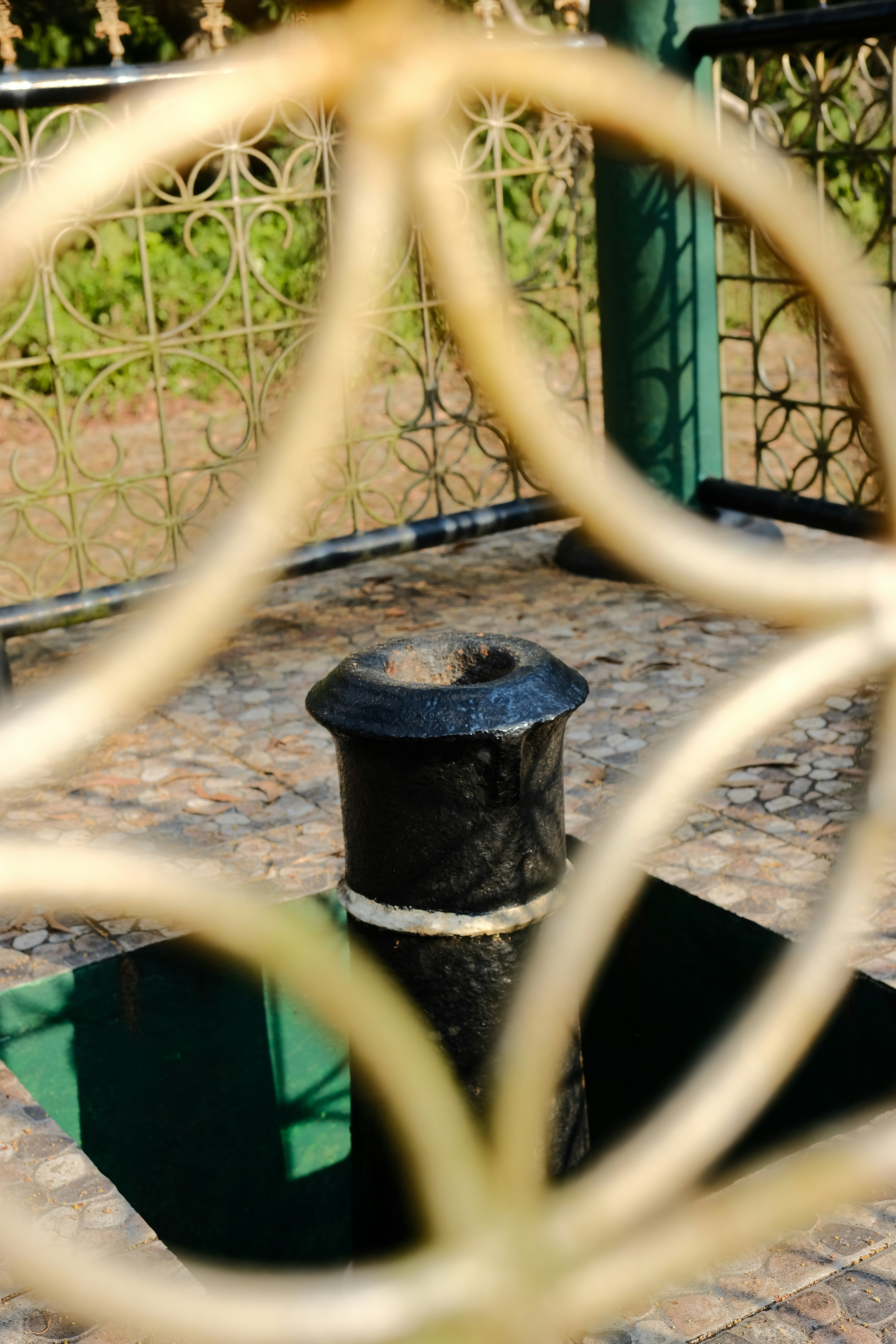 Ringed Gate, Weathered Post: A Quiet Courtyard Portrait
