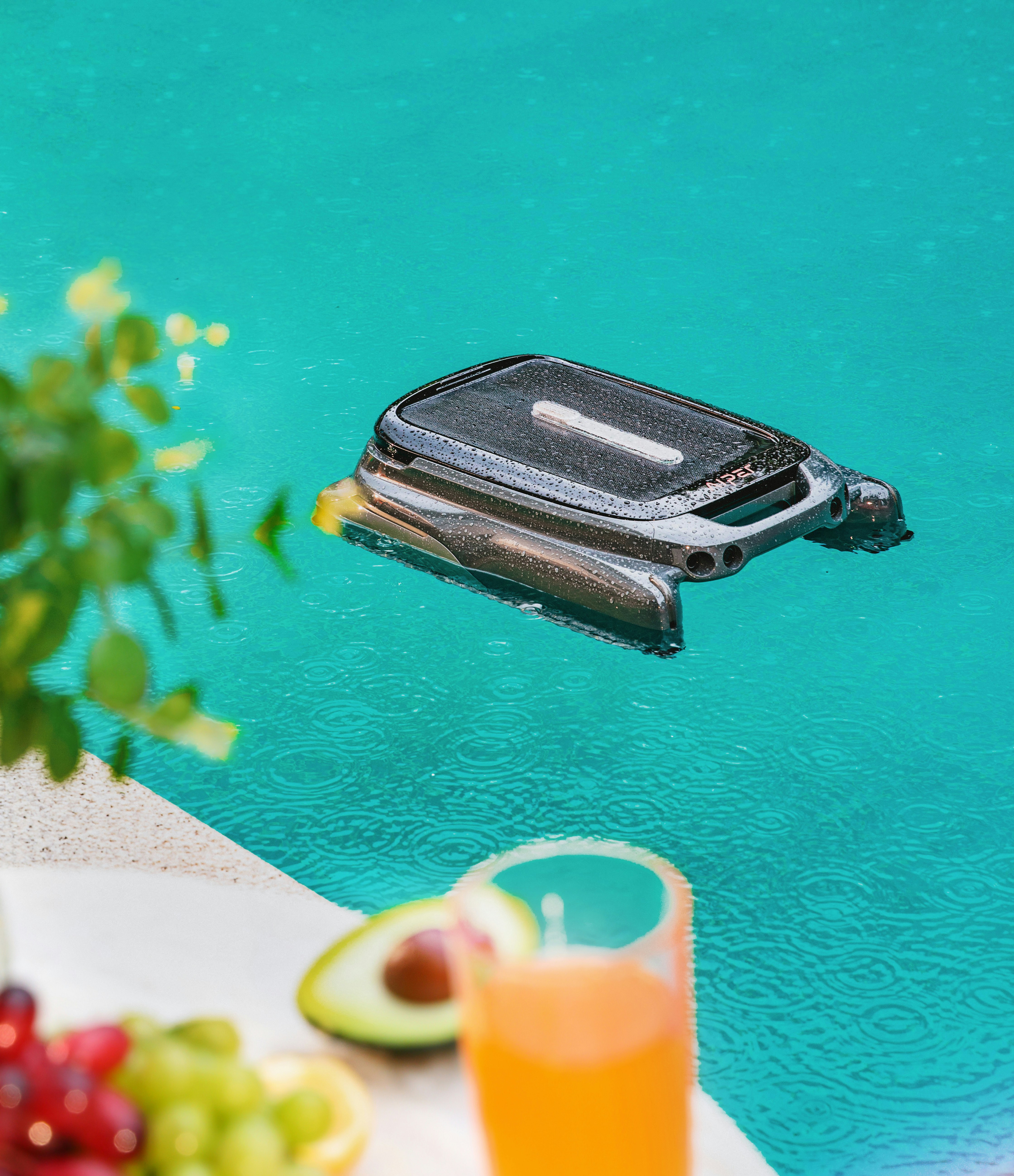 The Aiper cordless robotic pool cleaner efficiently cleaning the pool.