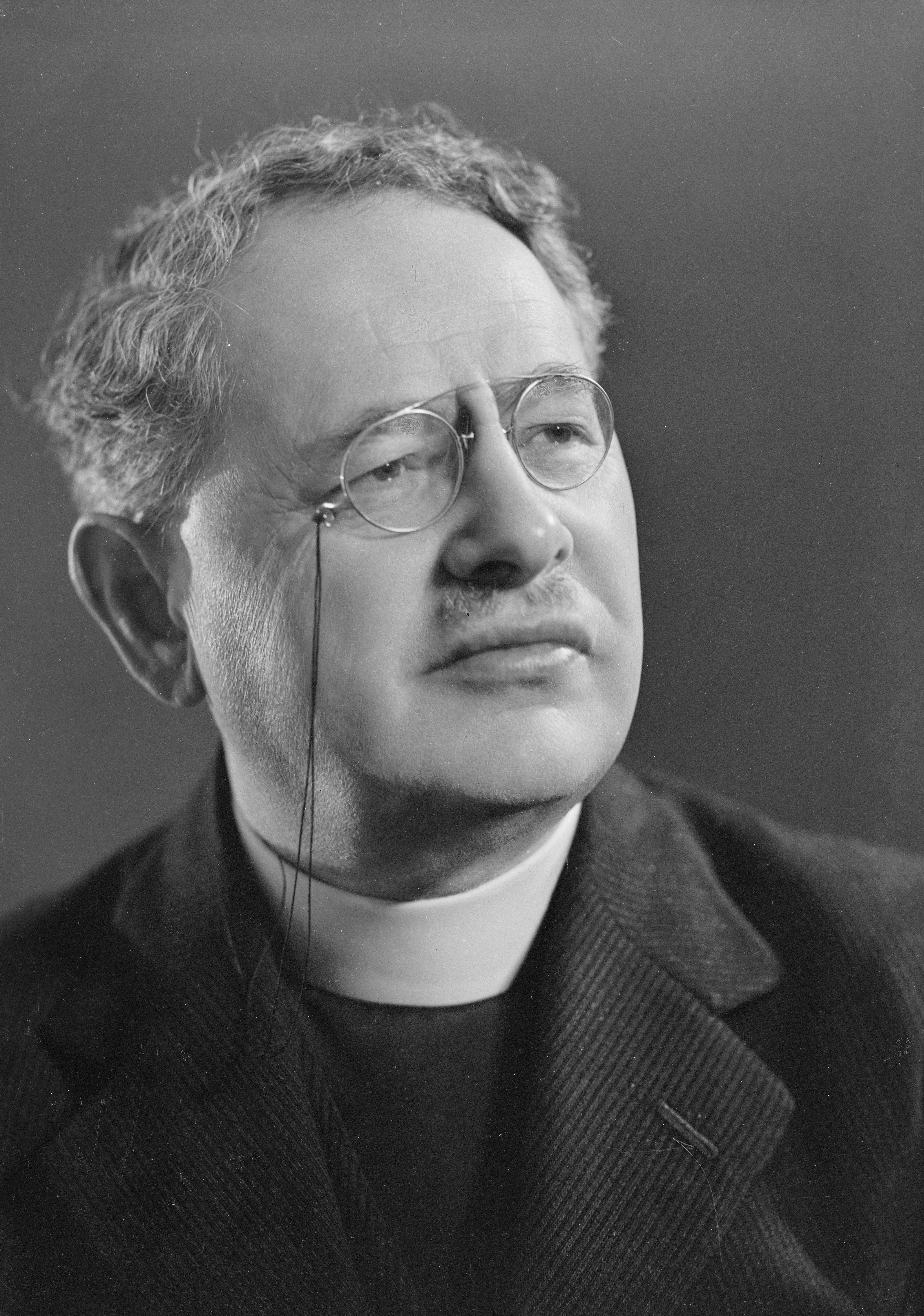 Man in clerical attire with monocle and spectacles photo – Free Glasses ...