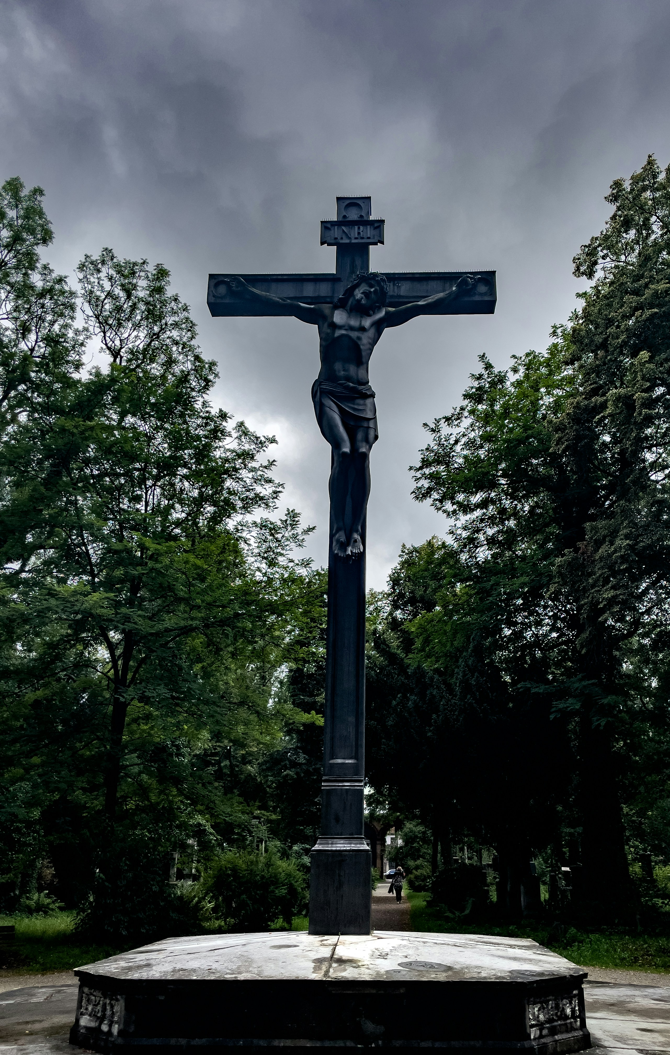 A large black cross with a crucifix in the middle of it photo – Free ...
