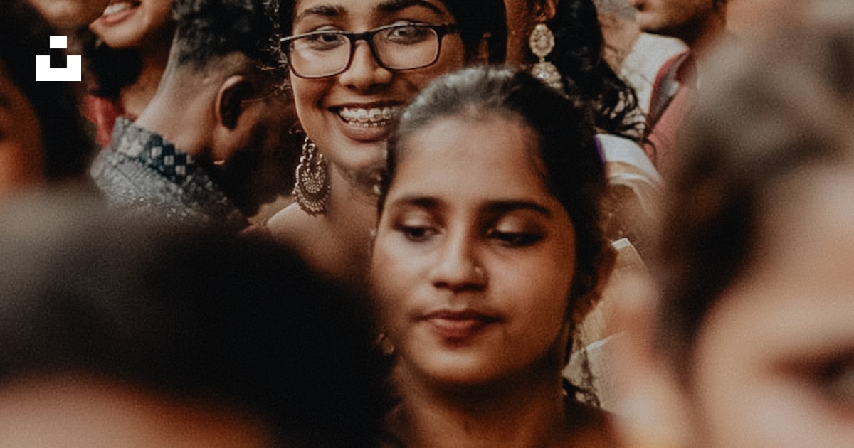 A Crowd Of People Standing Next To Each Other Photo Free Head Image