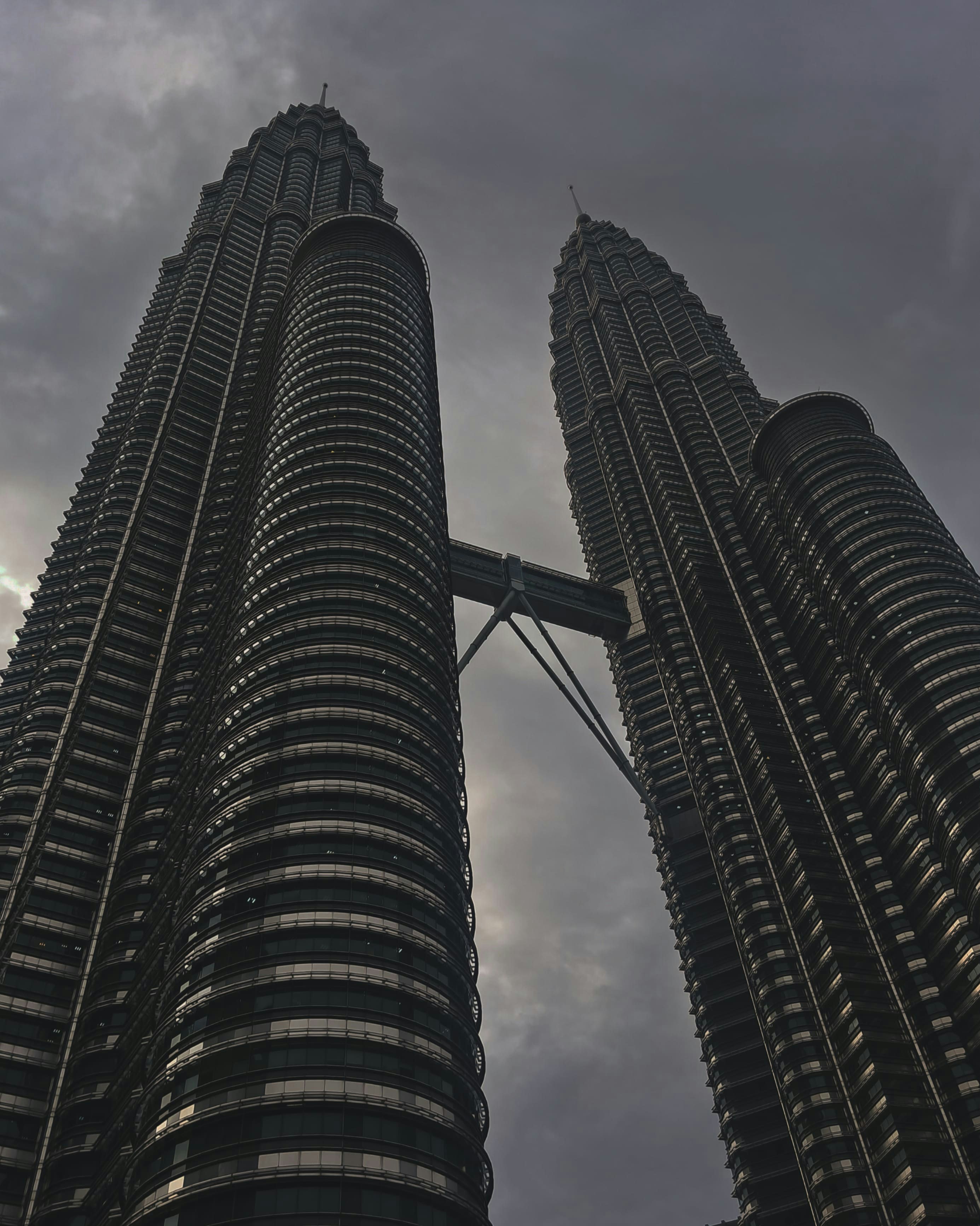 Two very tall buildings towering into the sky photo – Free Architecture ...
